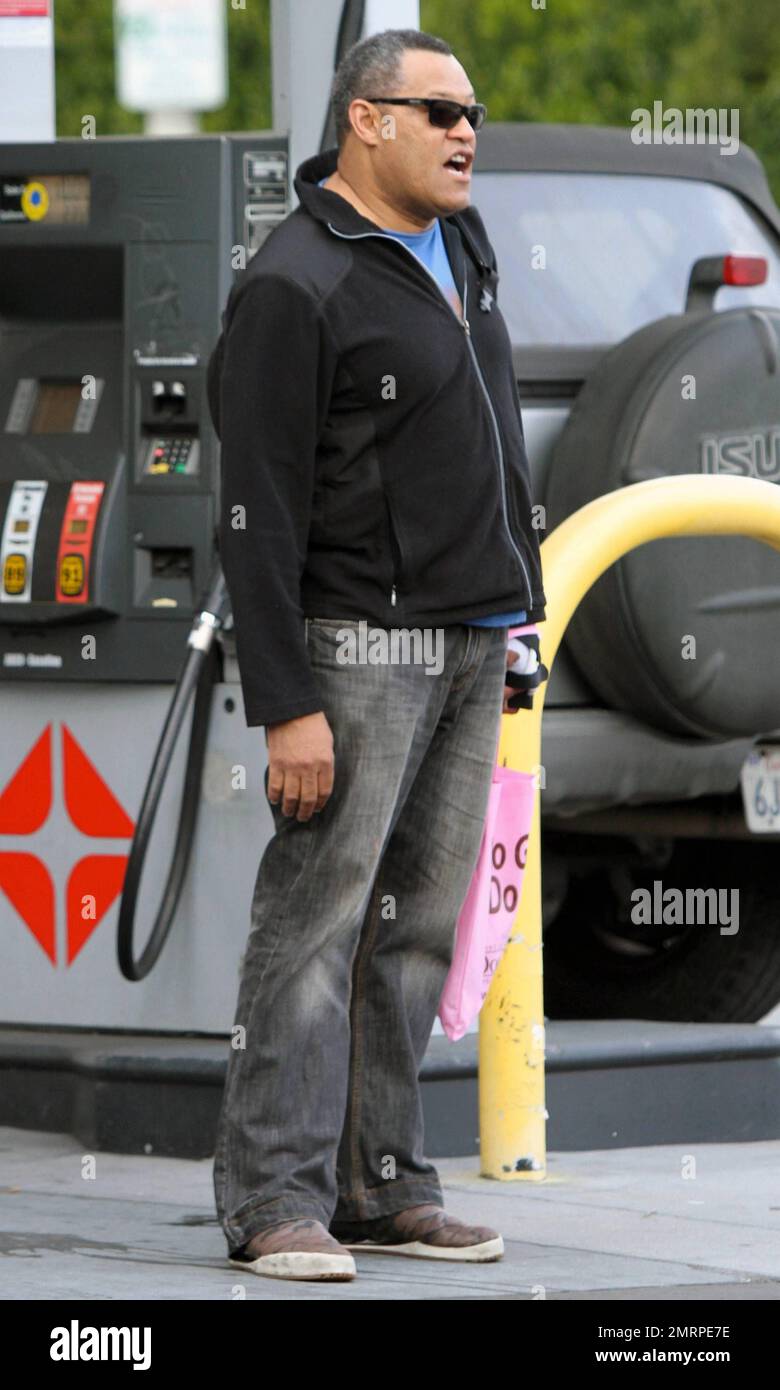 EXCLUSIVE!! Actor Laurence Fishburne looks frustrated as he waits for a ...