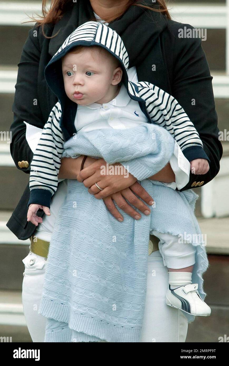 Boris Becker and Sharlely Becker's baby Amadeus being held by their ...