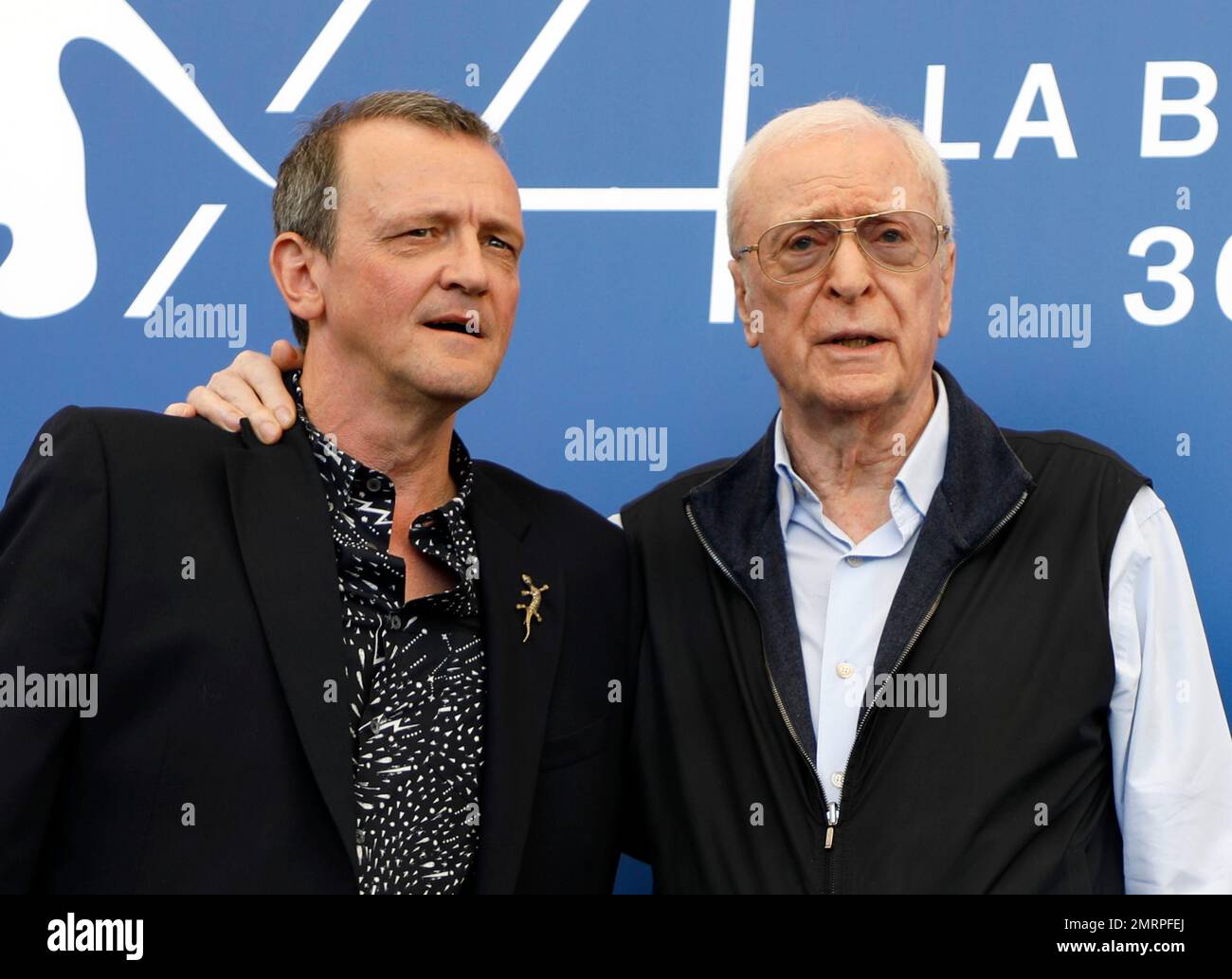 Director David Batty, left, and actor Michael Caine pose for ...