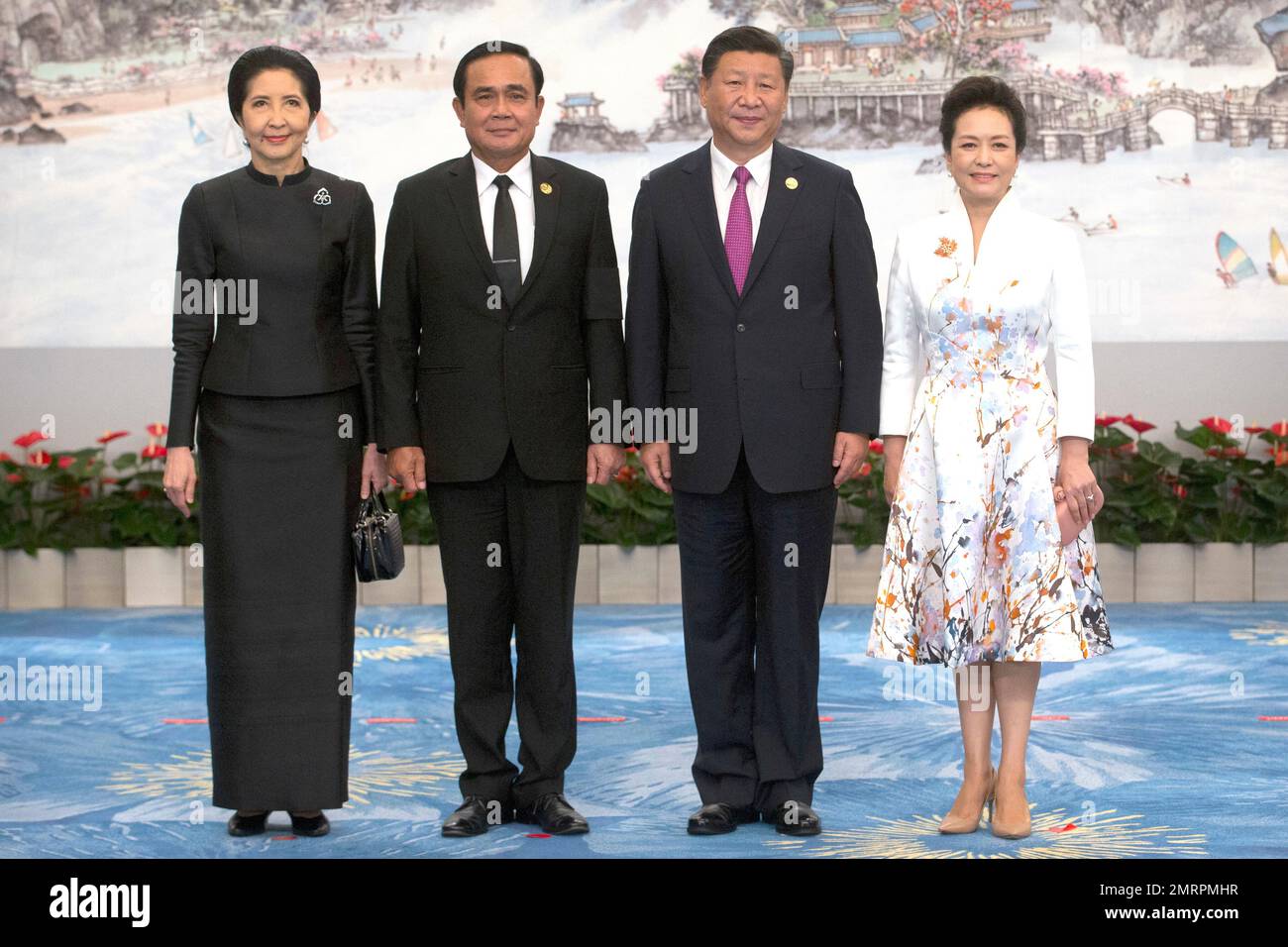 Thailand's Prime Minister Prayuth Chan-ocha, second from left, and his wife Naraporn Chan-ocha ...