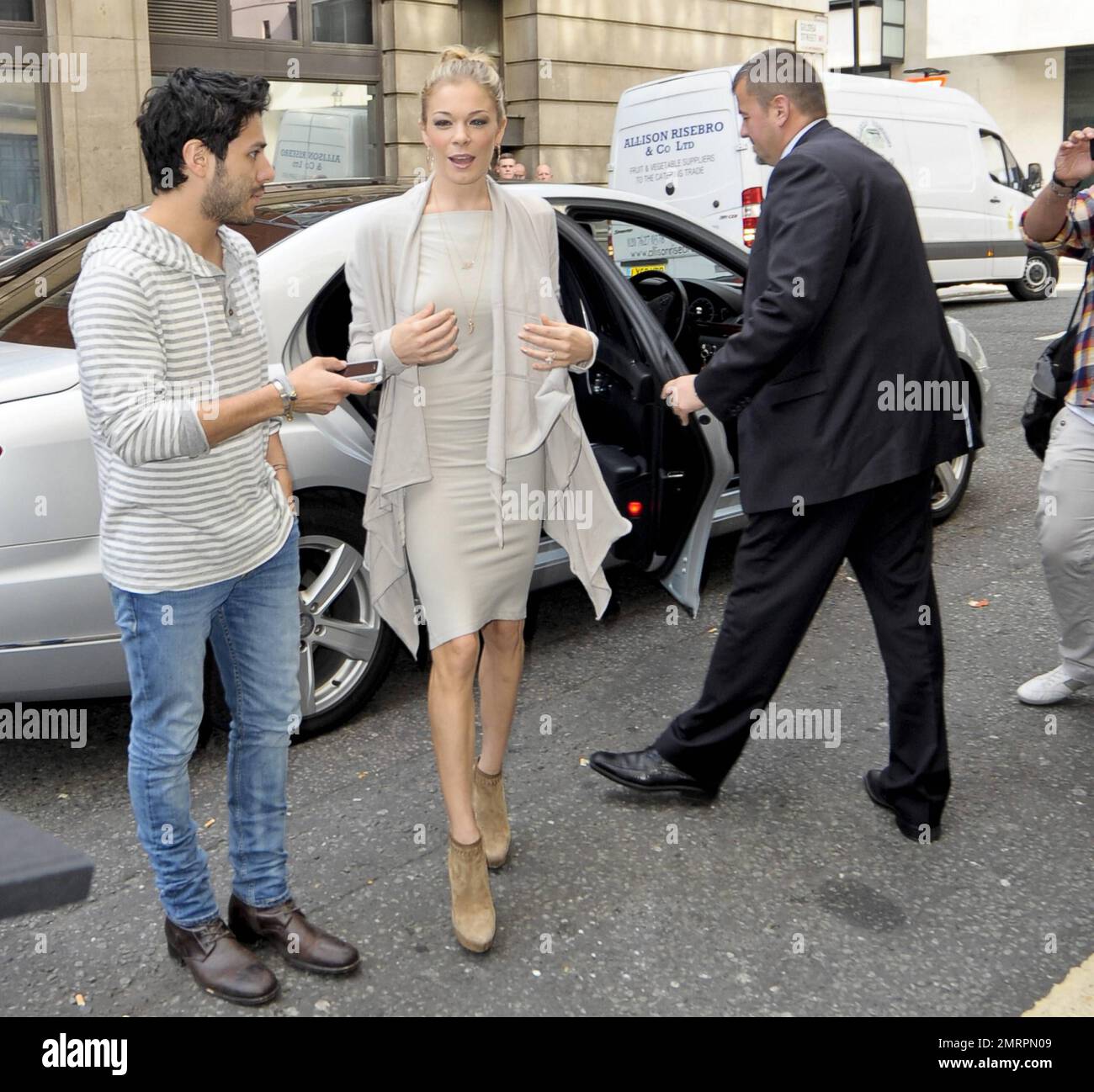 Lady in tan boots hi-res stock photography and images - Alamy