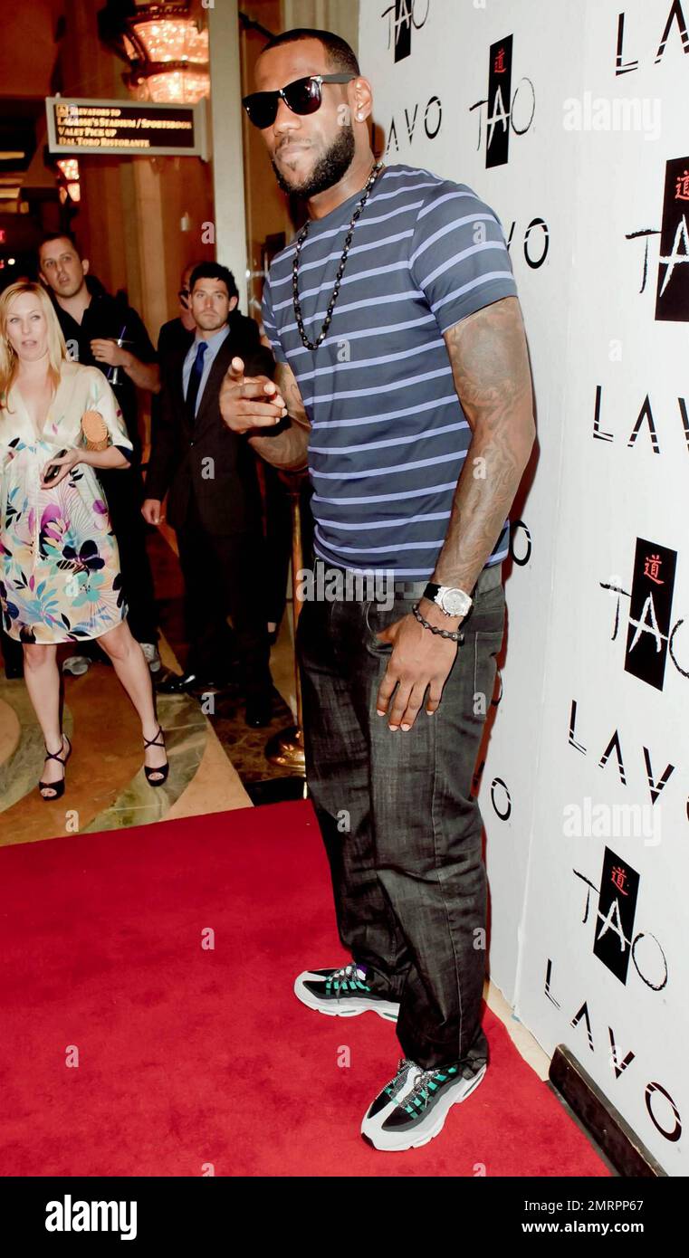 Basketball player LeBron James, 25, of the Miami Heat speaks with ...