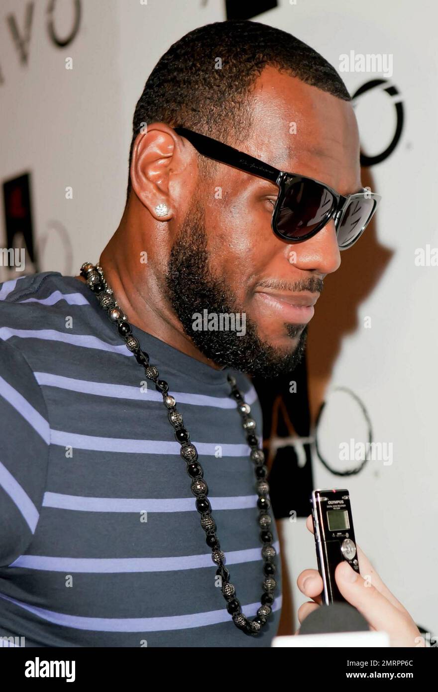 Basketball player LeBron James, 25, of the Miami Heat speaks with ...