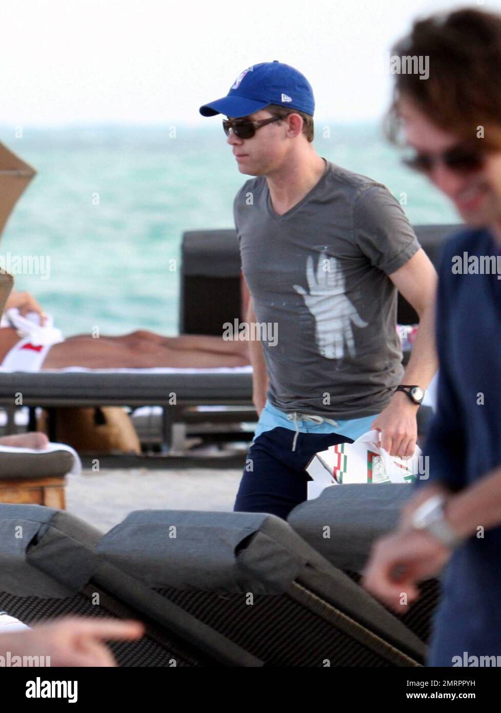 Actor and comedian Lee Evans enjoys the New Year's holiday on the beach ...