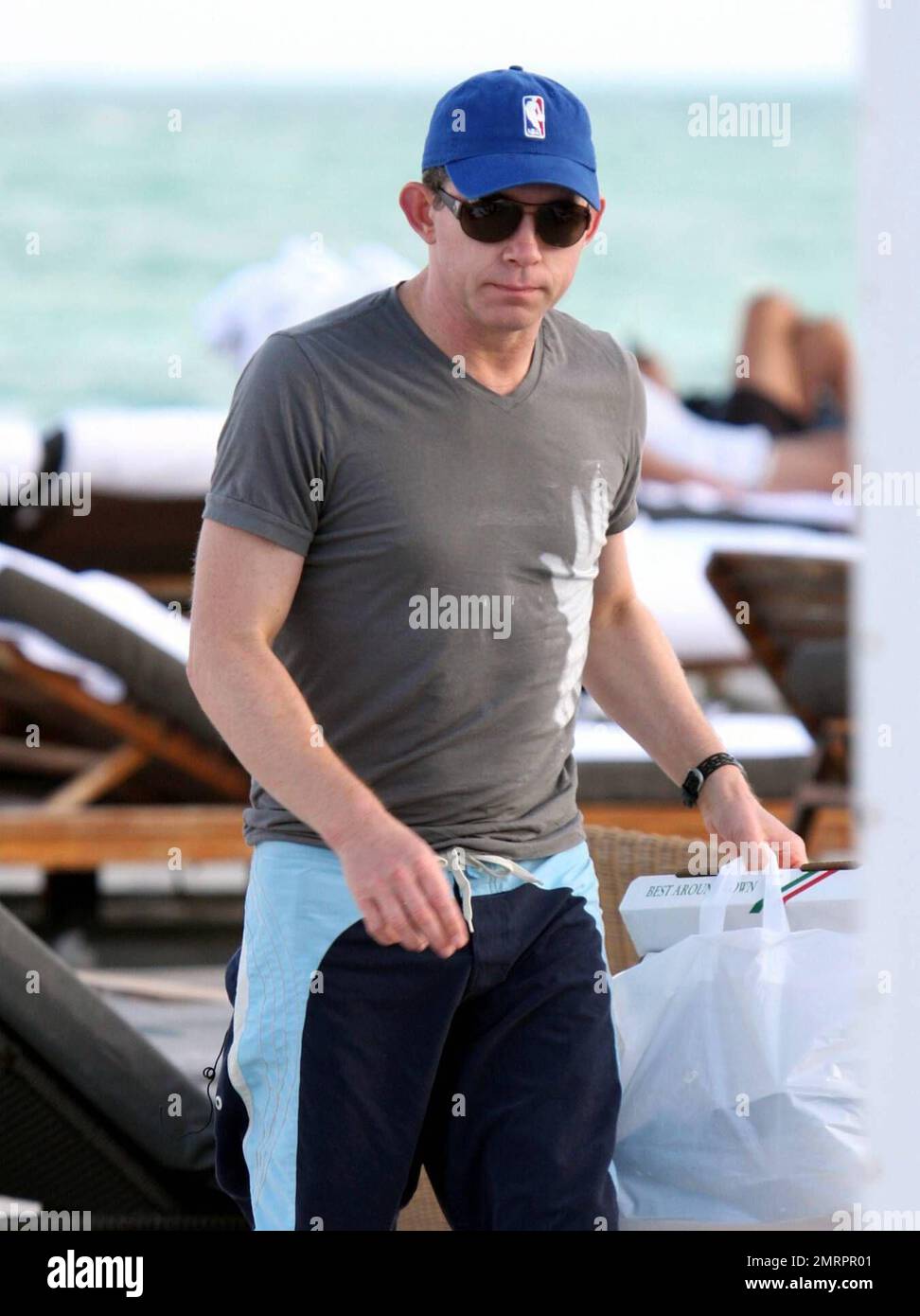 Actor and comedian Lee Evans enjoys the New Year's holiday on the beach ...