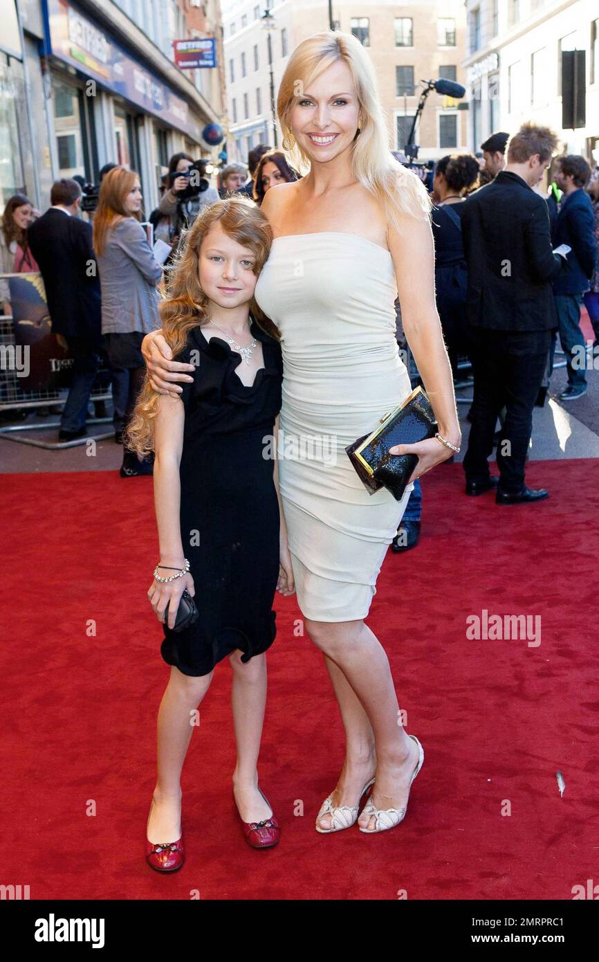 Anneka Tanaka-Svenska and daughter pose for photographers on the red ...