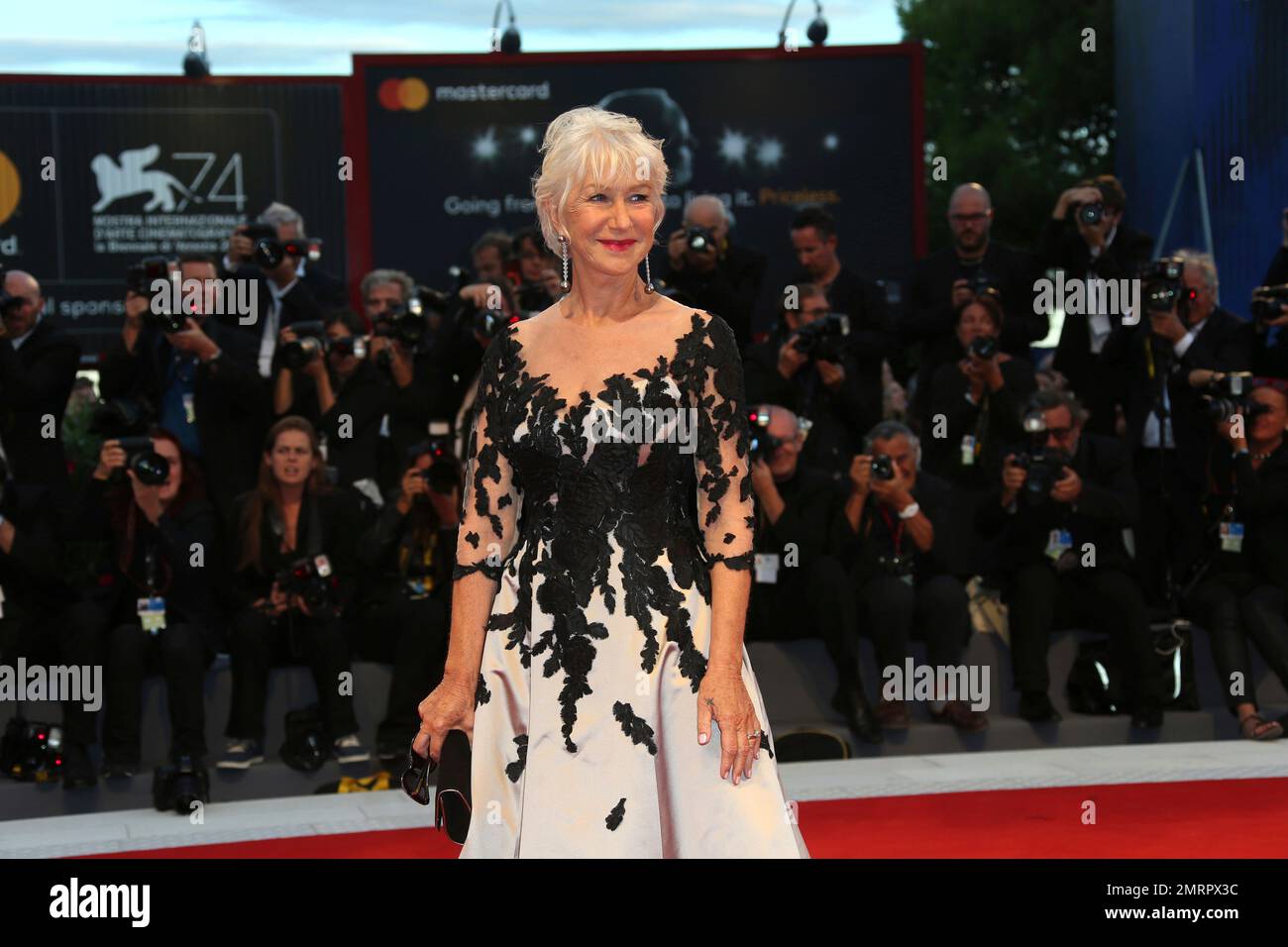 Actress Helen Mirren poses for photographers upon arrival at the ...