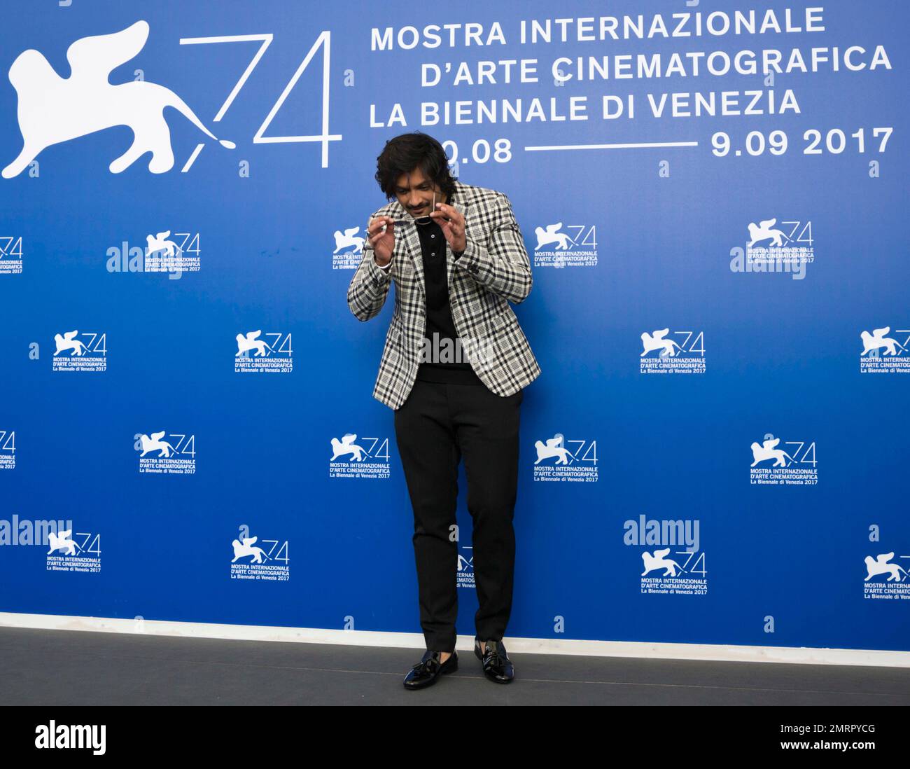 Actor Ali Fazal poses during a photo call for the film "Victoria And ...