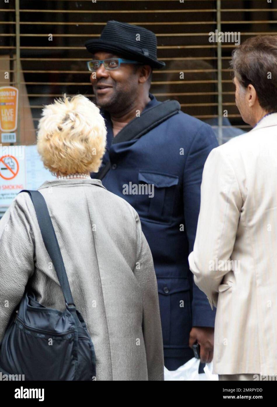Lenny Henry chats with fans outside the Groucho Club in Soho. London ...