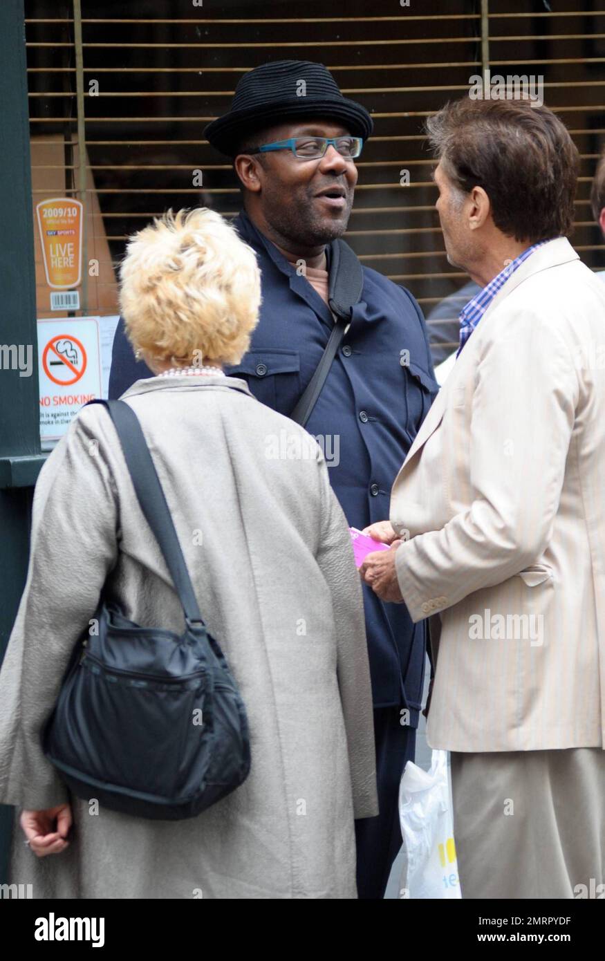 Lenny Henry chats with fans outside the Groucho Club in Soho. London ...