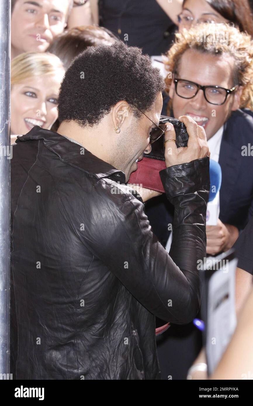 SPAIN OUT - Lenny Kravitz turns the tables on photographers, taking photos of them as he attends ...