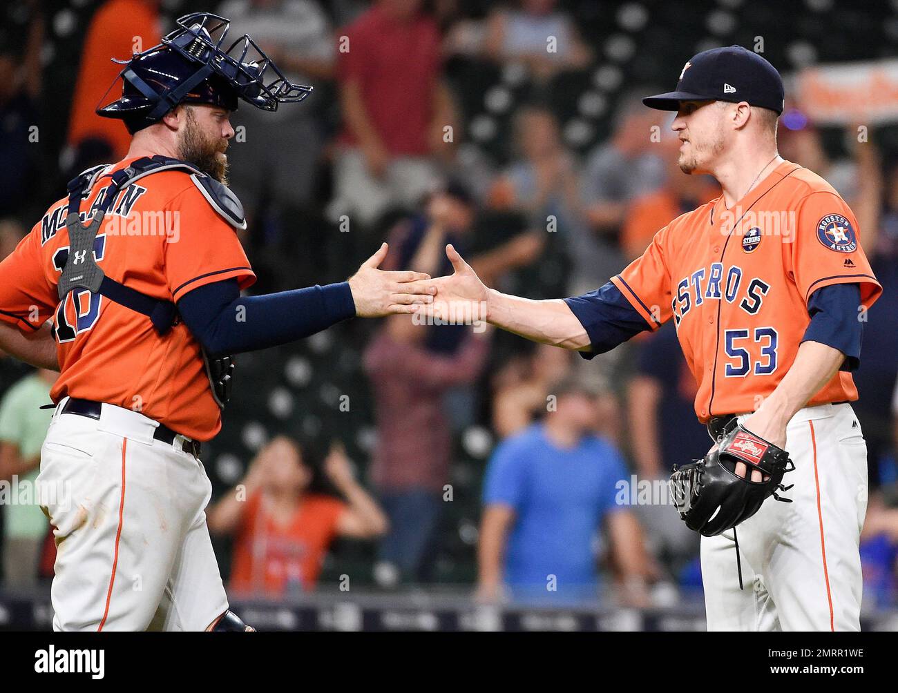 Houston Astros relief pitcher Ken Giles (53) clasps hands with catcher ...
