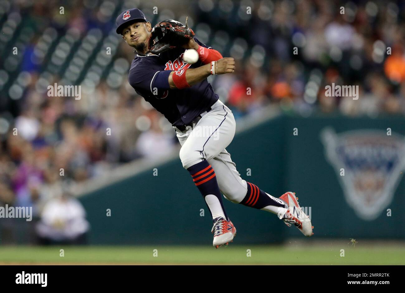 Cleveland Indians shortstop Francisco Lindor throws to first but is ...