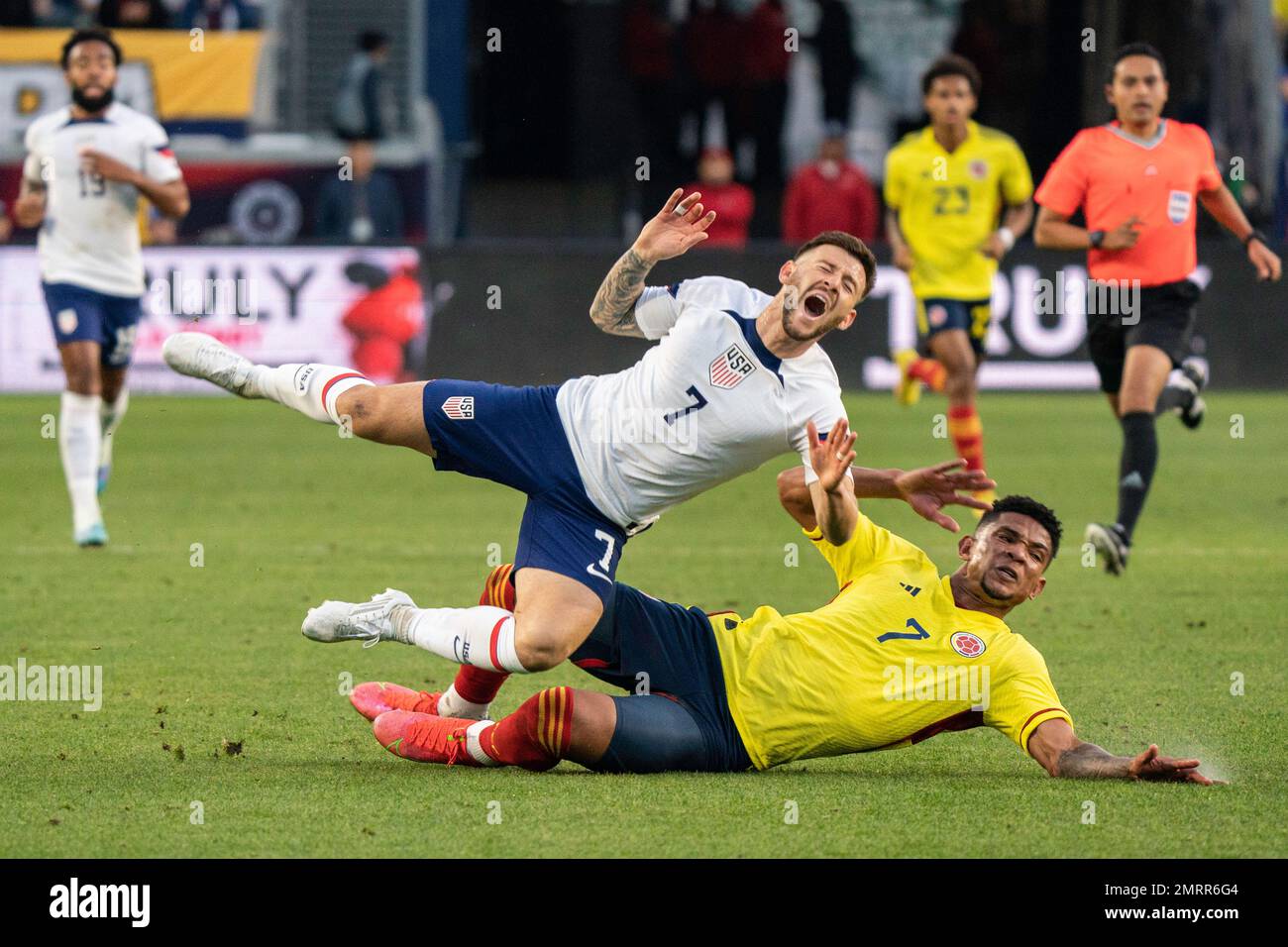 Colombia forward Diego Valoyes (7) makes a slide tackle against United ...