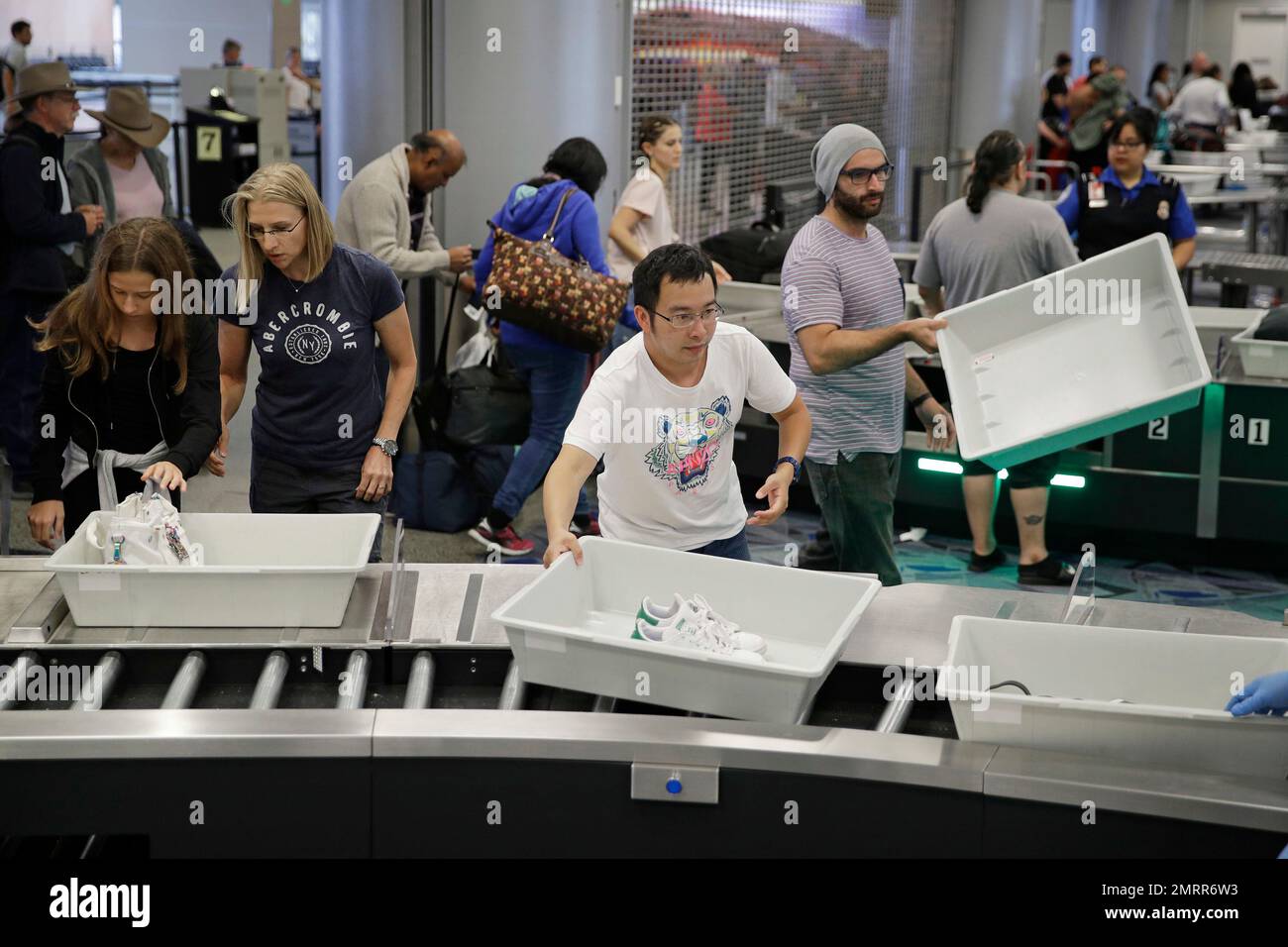 In this Sept. 1, 2017, photo, people use newly installed automated ...