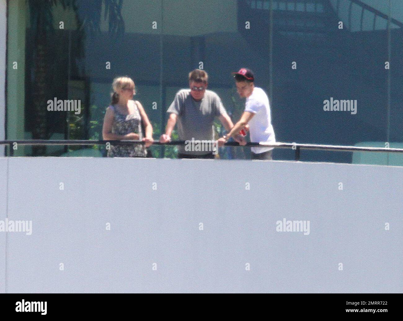 EXCLUSIVE!! One Direction boy band singer Liam Payne is joined by his ...