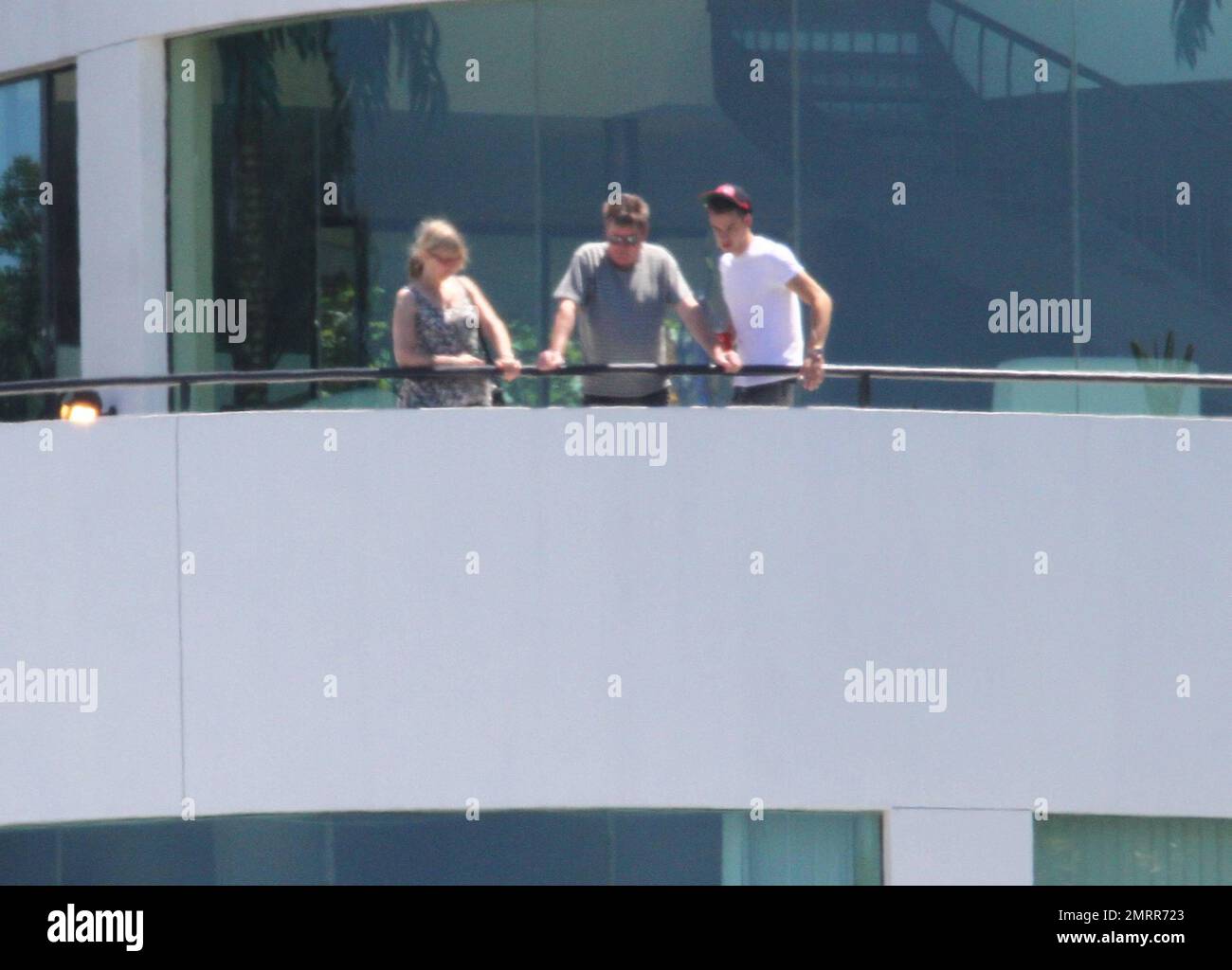 EXCLUSIVE!! One Direction boy band singer Liam Payne is joined by his ...