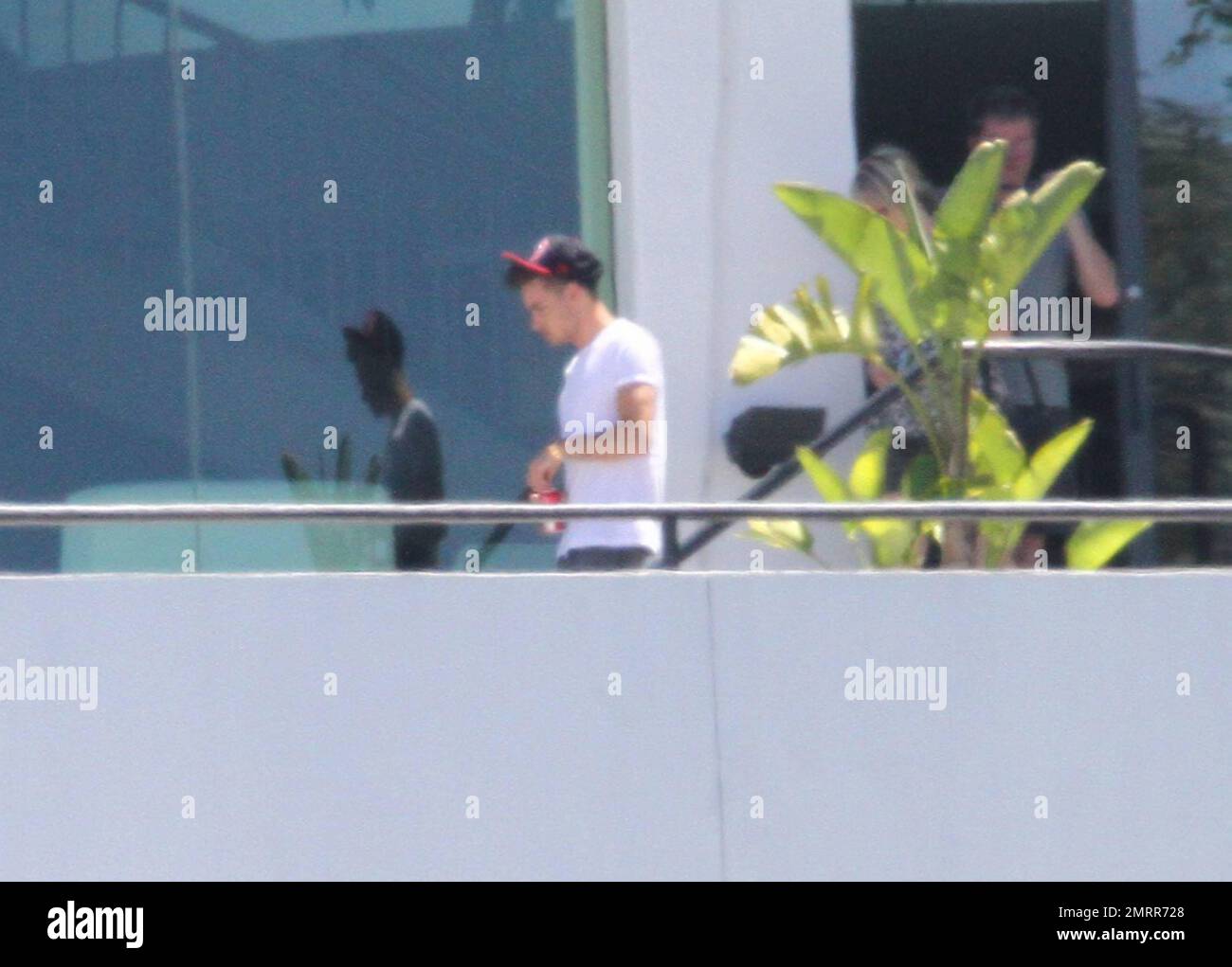 EXCLUSIVE!! One Direction boy band singer Liam Payne is joined by his ...