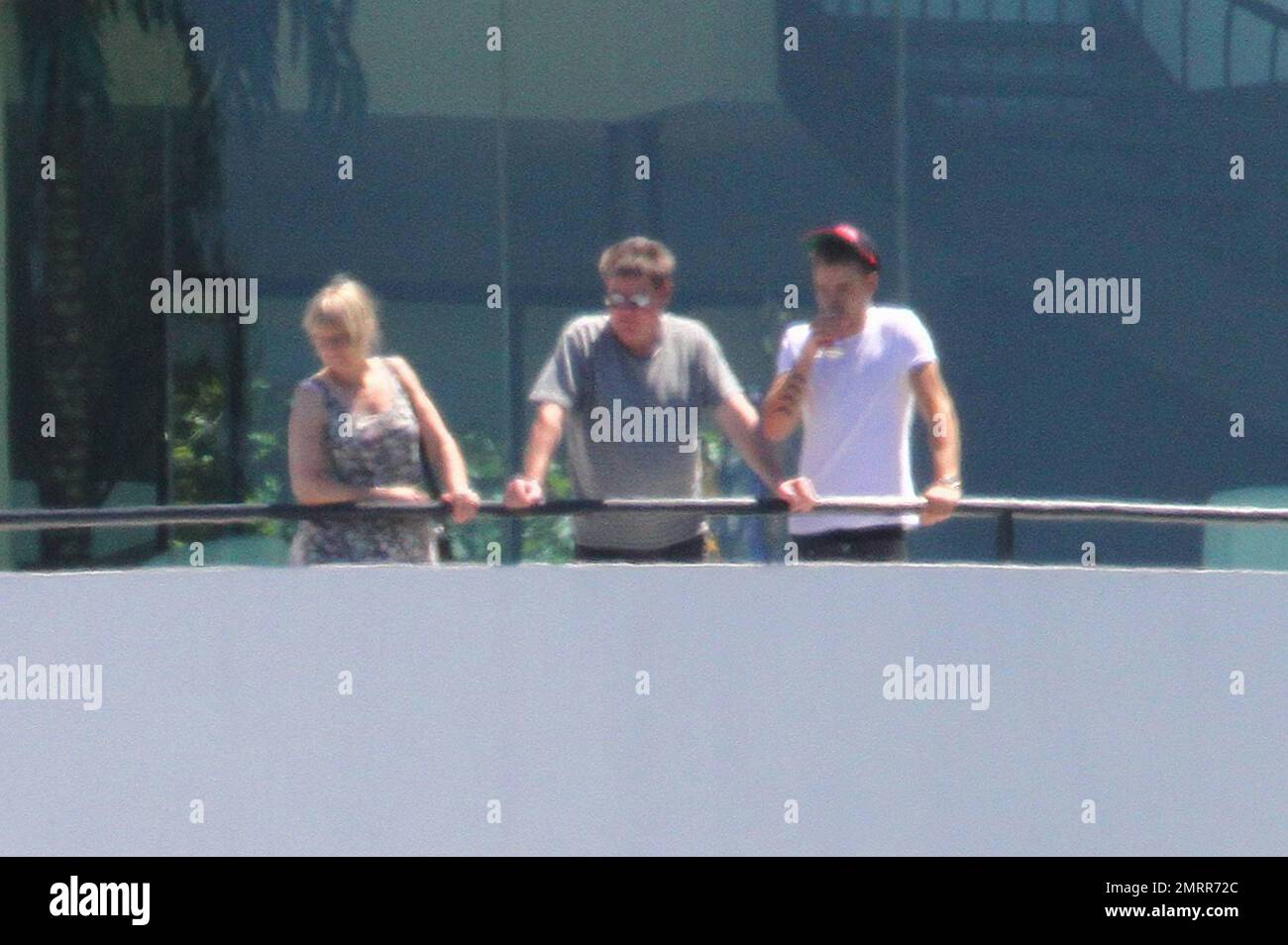 EXCLUSIVE!! One Direction boy band singer Liam Payne is joined by his ...