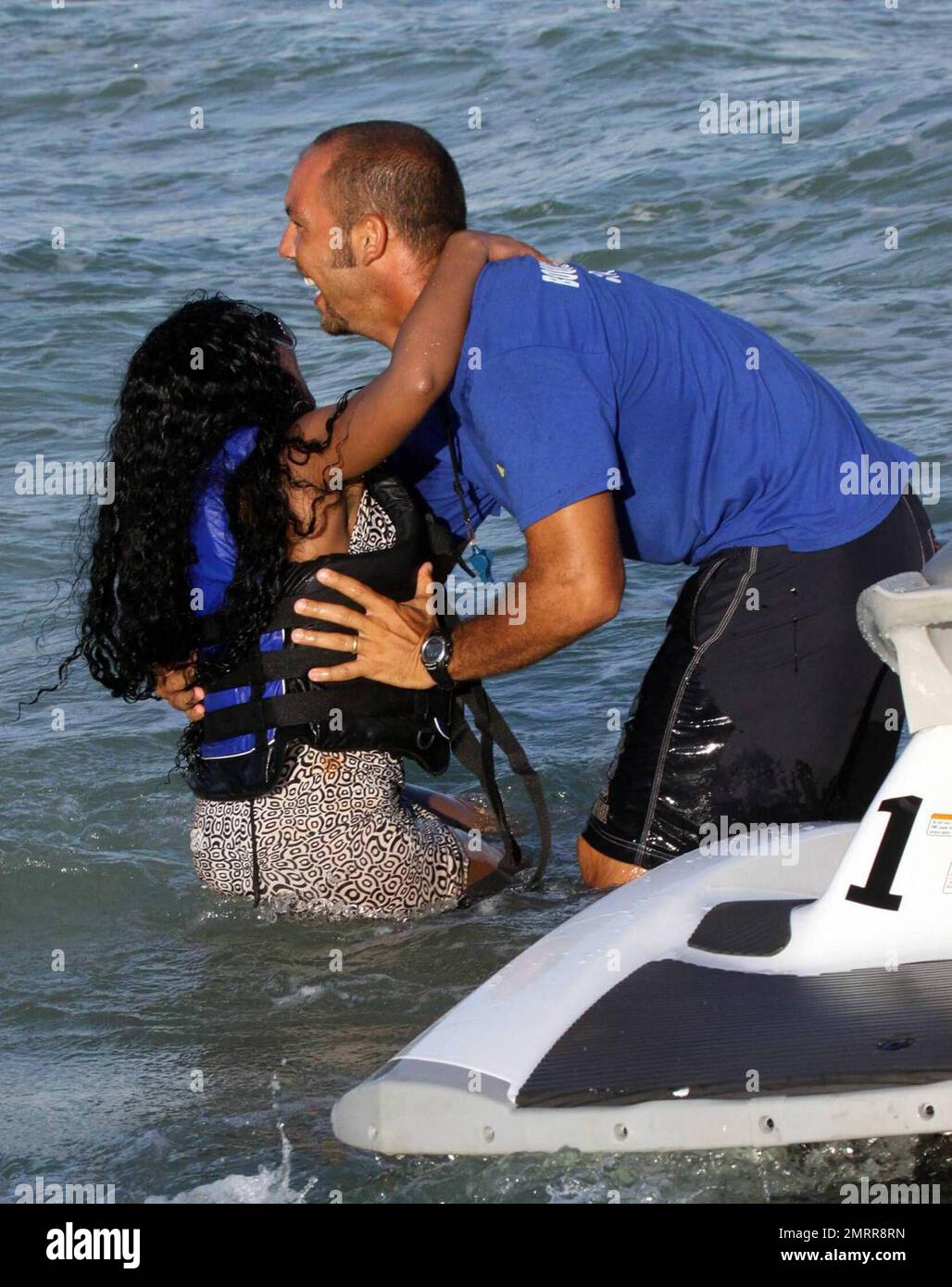 Lil' Kim and her girlfriends enjoy an afternoon at the beach playing on ...