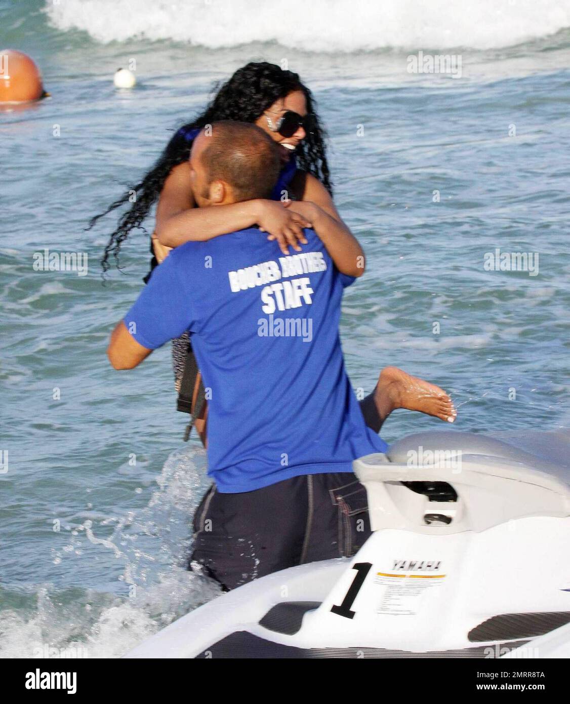 Lil' Kim and her girlfriends enjoy an afternoon at the beach playing on ...