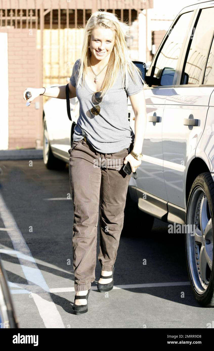 Hip hop singer Lil' Romeo (aka Romeo Miller) carries his Louis Vuitton ...