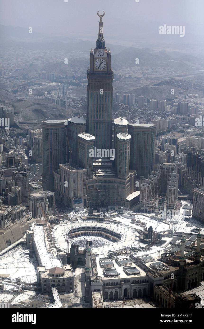 An aerial view of the clock towers over the Grand mosque as Muslim ...