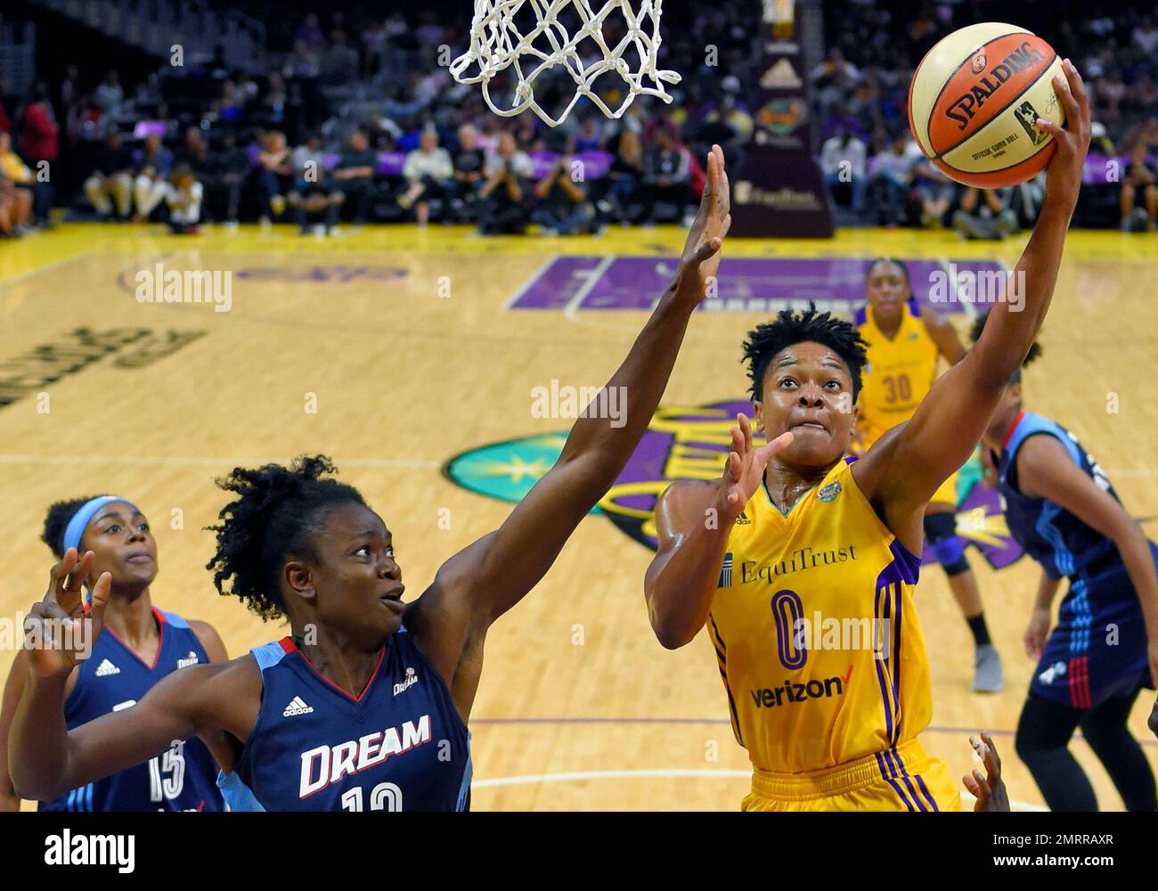 Los Angeles Sparks guard Alana Beard, right, shoots as Atlanta Dream ...