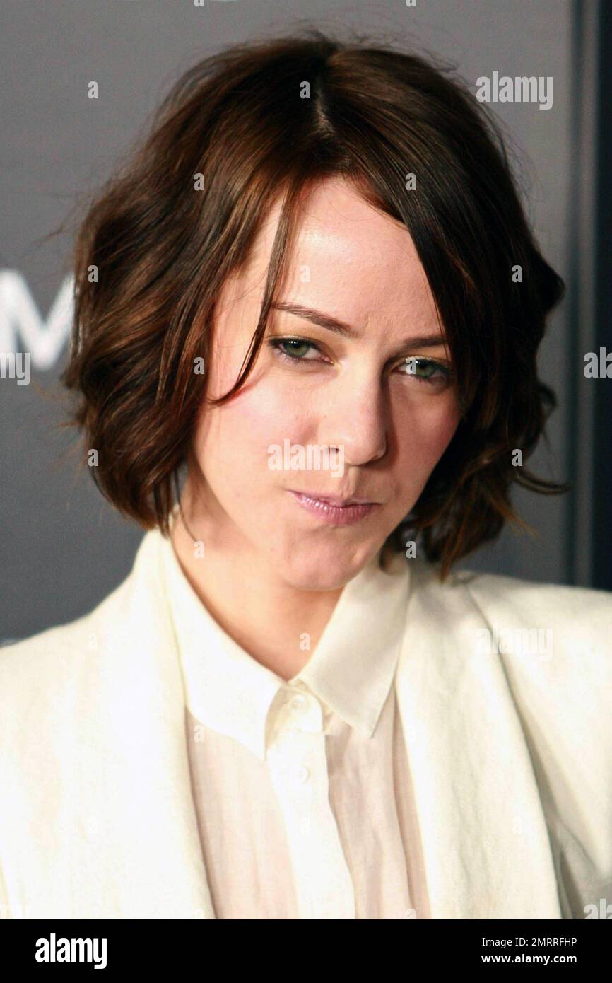 Wearing a sophisticated white blouse and white skirt suit Jena Malone ...