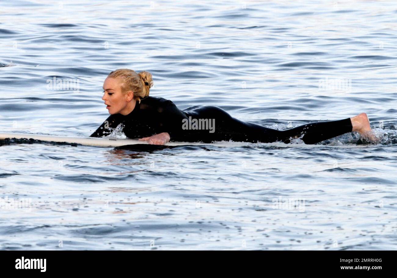 Surf wetsuit actress hi-res stock photography and images - Alamy