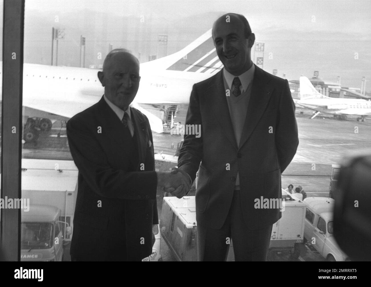 Andre Turcat, right, former test pilot of the Concorde shakes hands ...