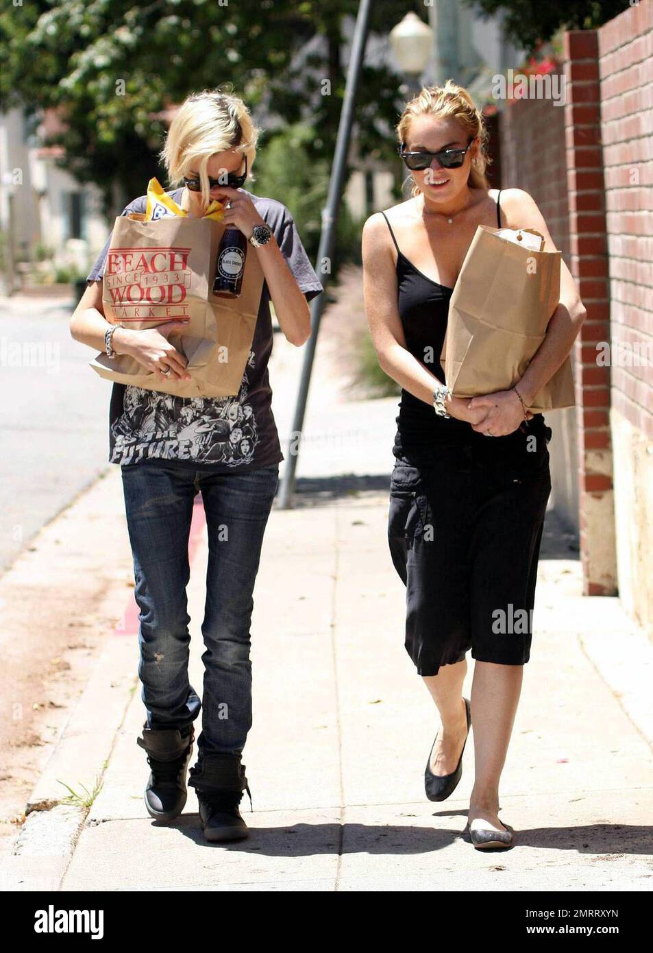 Lindsay Lohan and BFF Samantha Ronson, recently home from a trip to ...