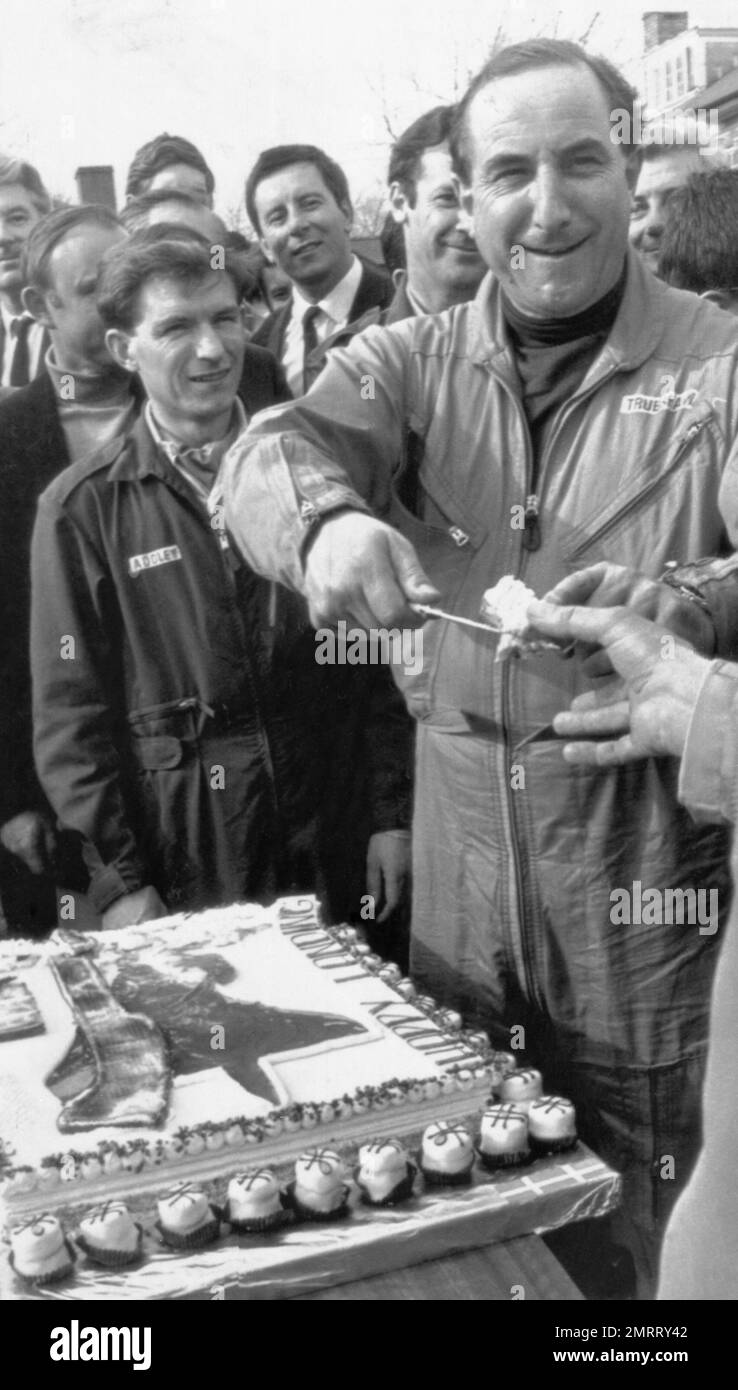 Concorde 002 test pilot Brian Trubshaw hands out pieces of celebration ...