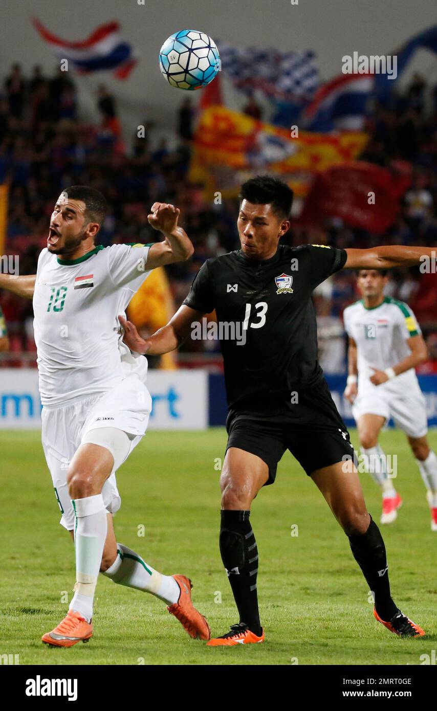 Ayman Hussein of Iraq, left, and Pansa Hemviboon of Thailand battle for ...