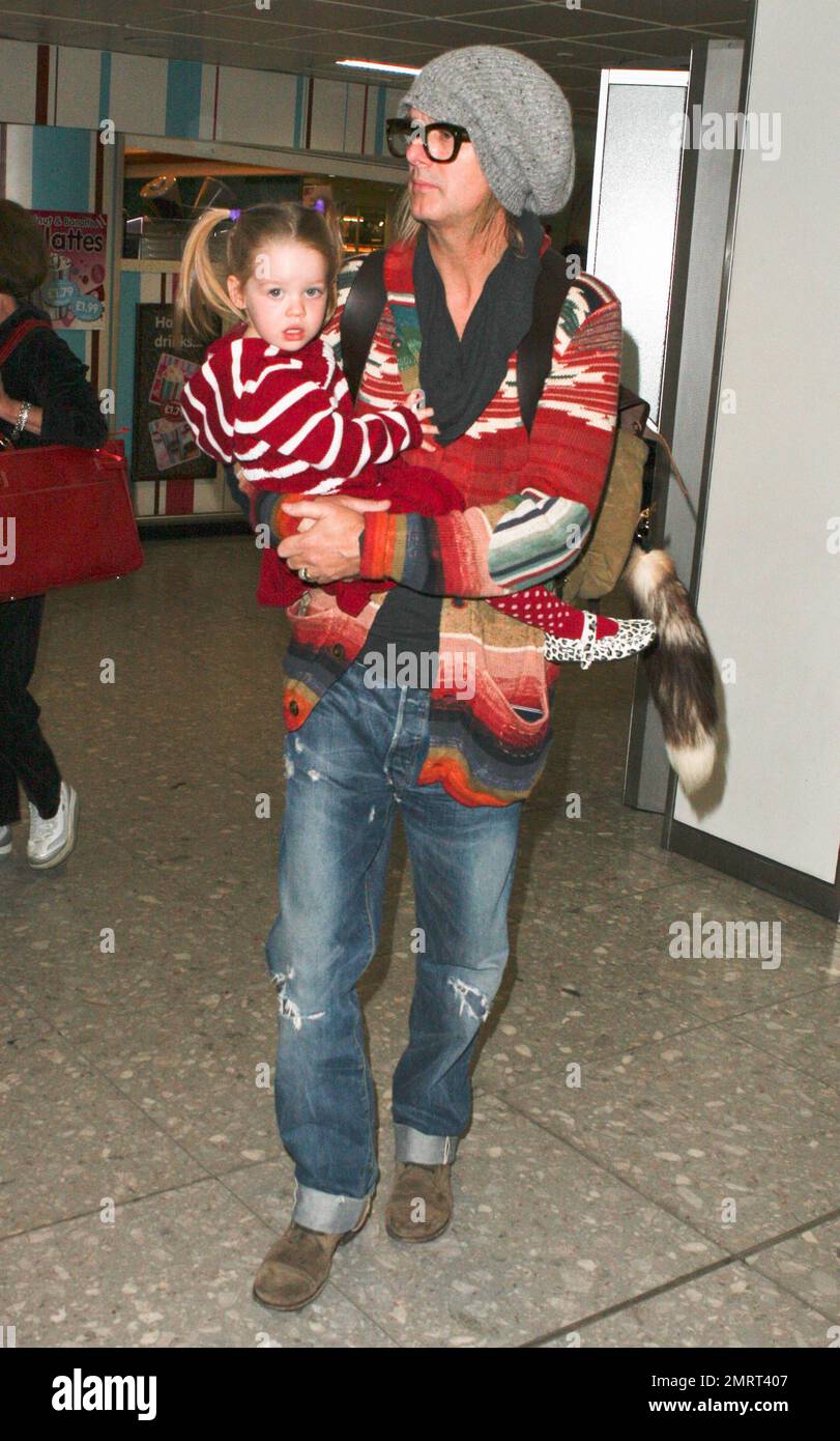 Lisa Marie Presley and husband Michael Lockwood carry their twin ...