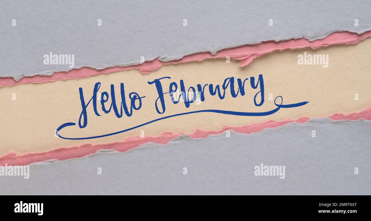 Hello February - handwriting on a handmade paper, calendar concept, web ...