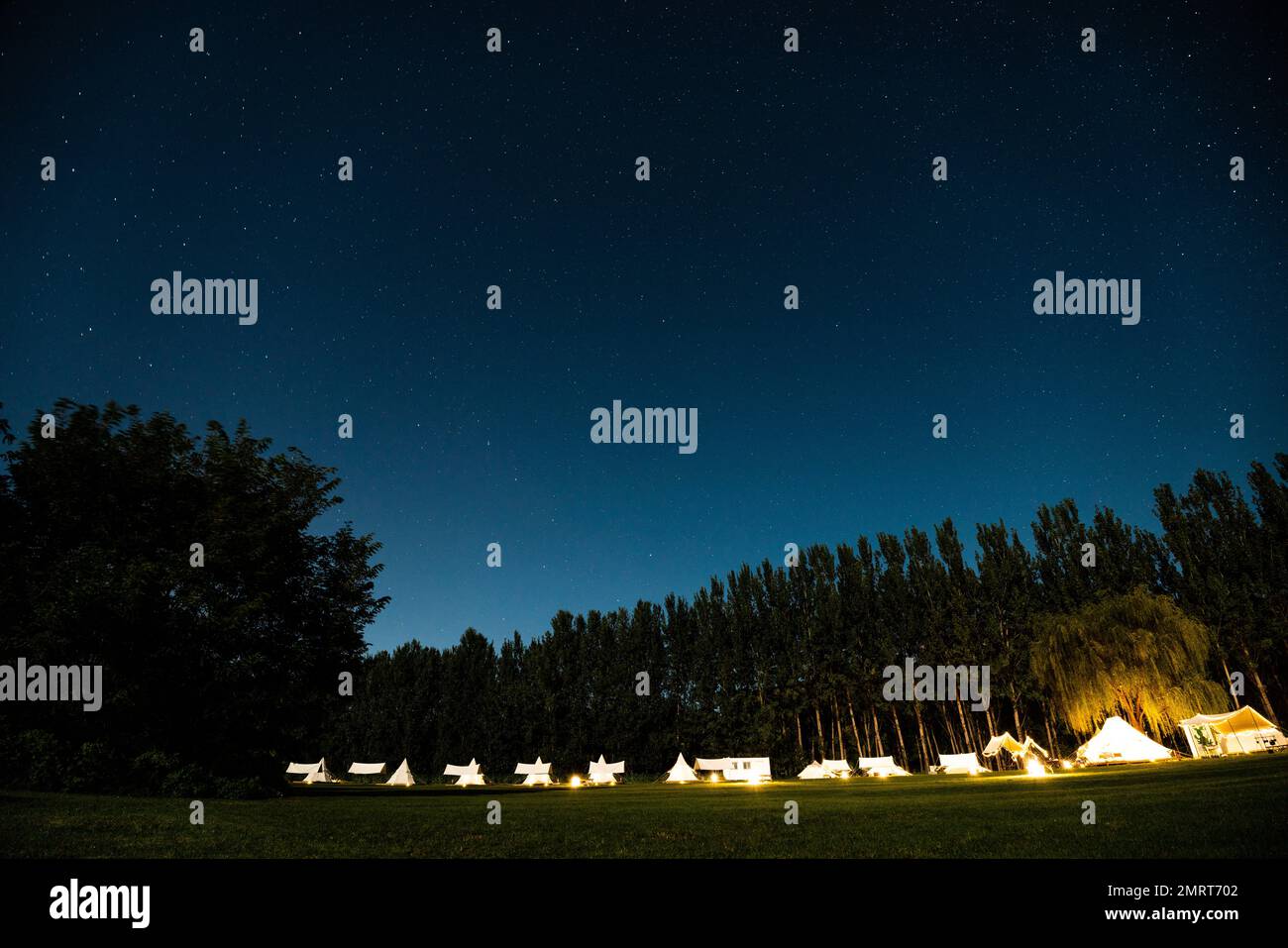 The night scenery of the camp Stock Photo - Alamy