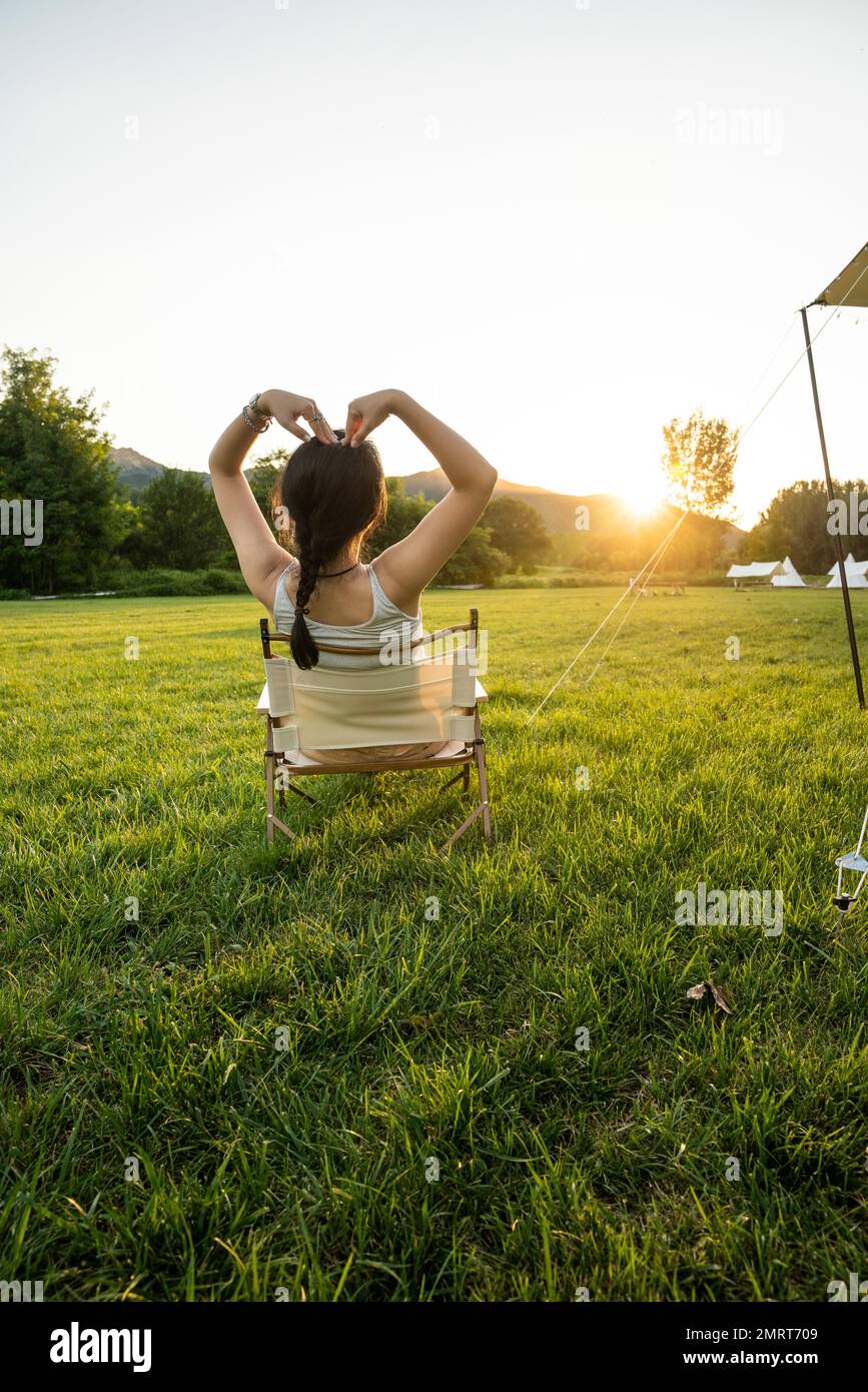 Sunshine girl sit chair Stock Photo - Alamy