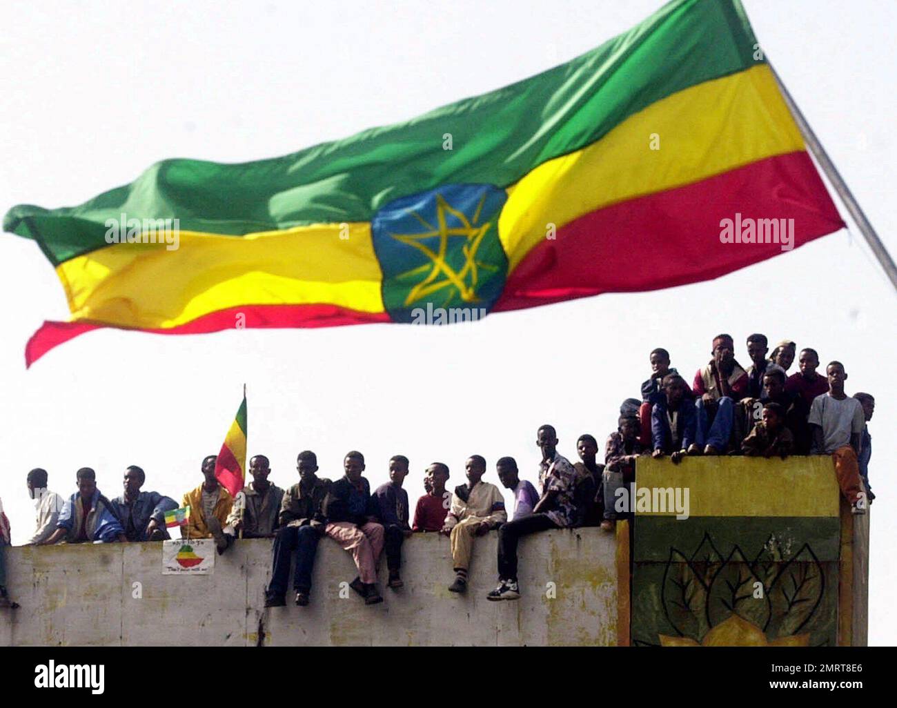 FILE - In this May, 28, 2000 file photo, Ethiopians sit under an ...