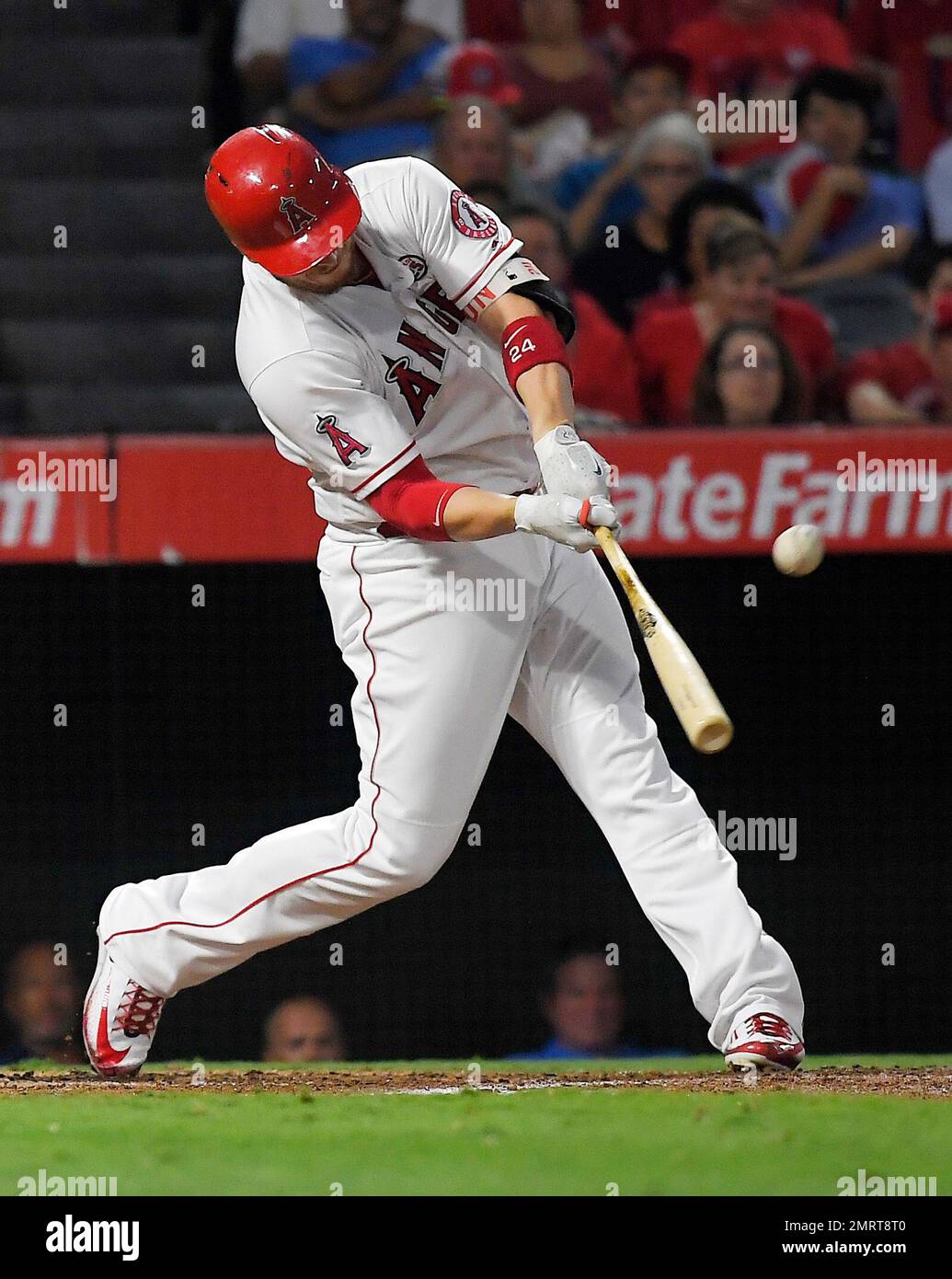 Los Angeles Angels' C.J. Cron hits a three-run home run during the ...