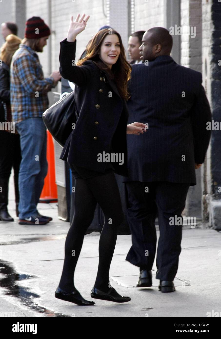 EXCLUSIVE!! Wearing an all-black outfit, actress Liv Tyler waves as she ...