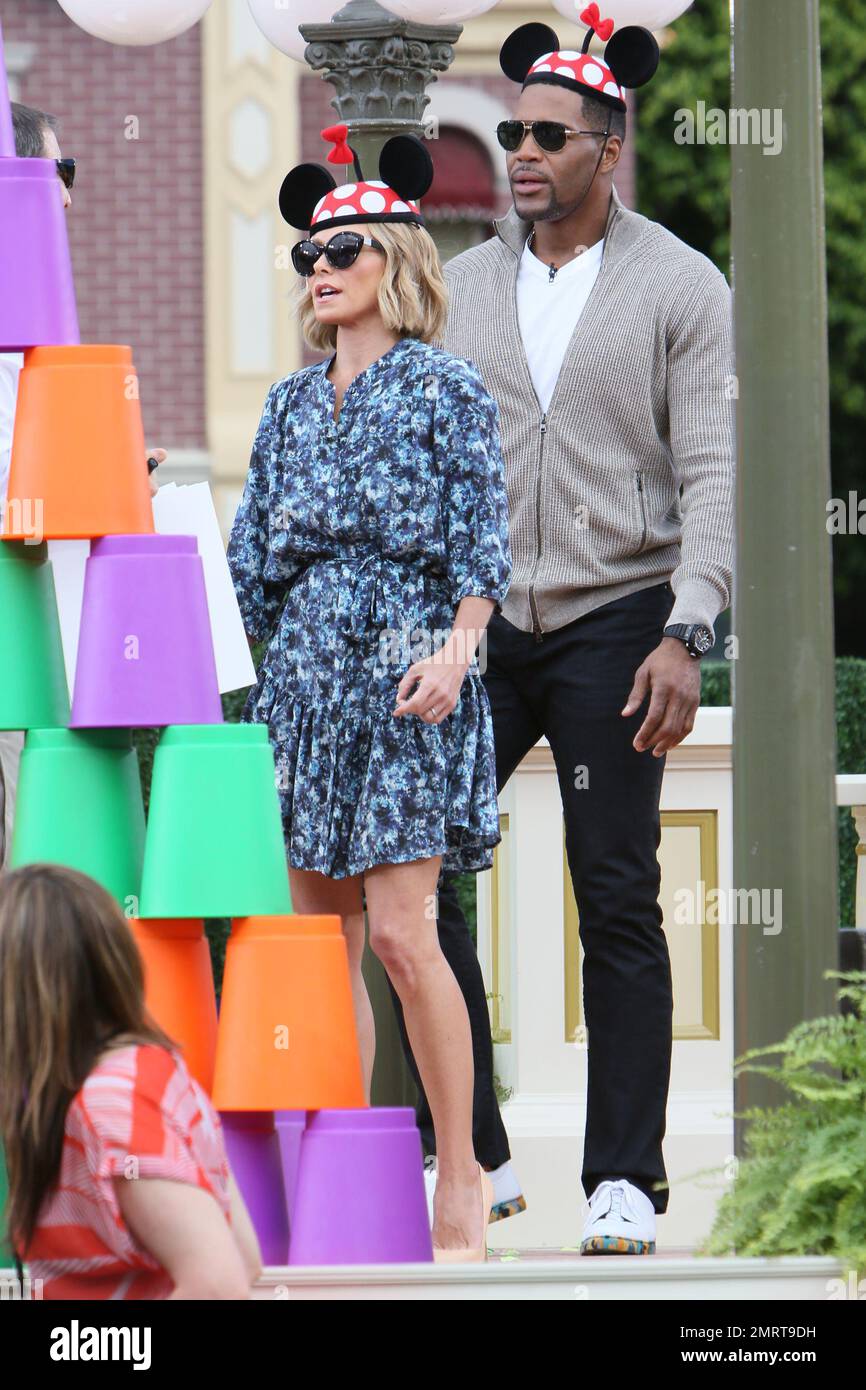 Kelly Rippa and Michael Strahan shoot their show at Disneyland. Los ...