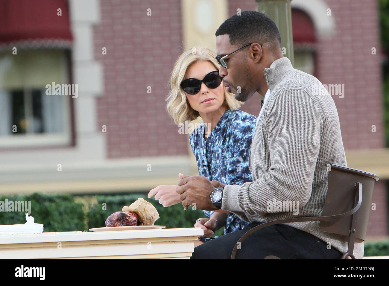 Kelly Rippa and Michael Strahan shoot their show at Disneyland. Los ...