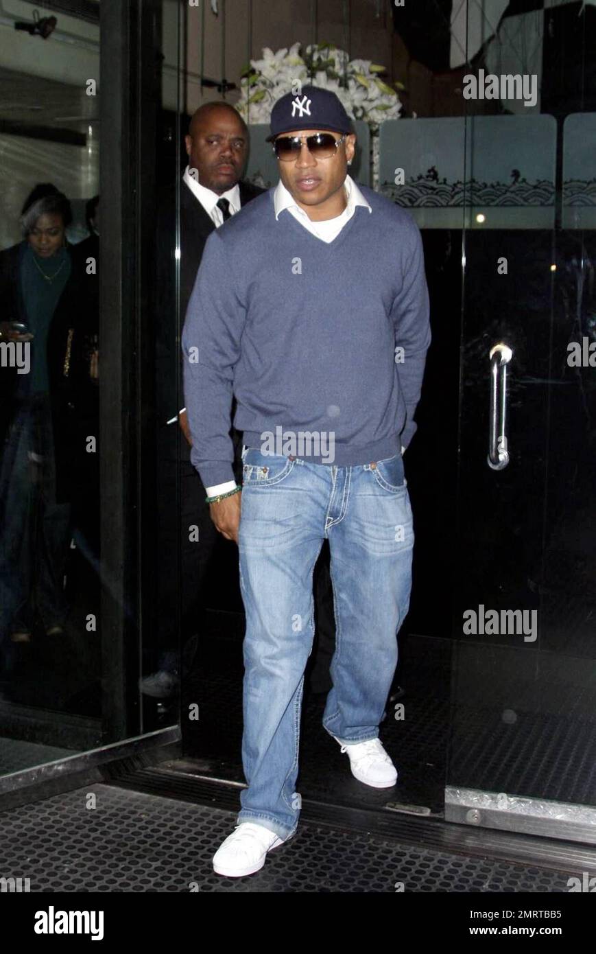 Rapper and actor LL Cool J leaves the restaurant Mr. Chow after having ...