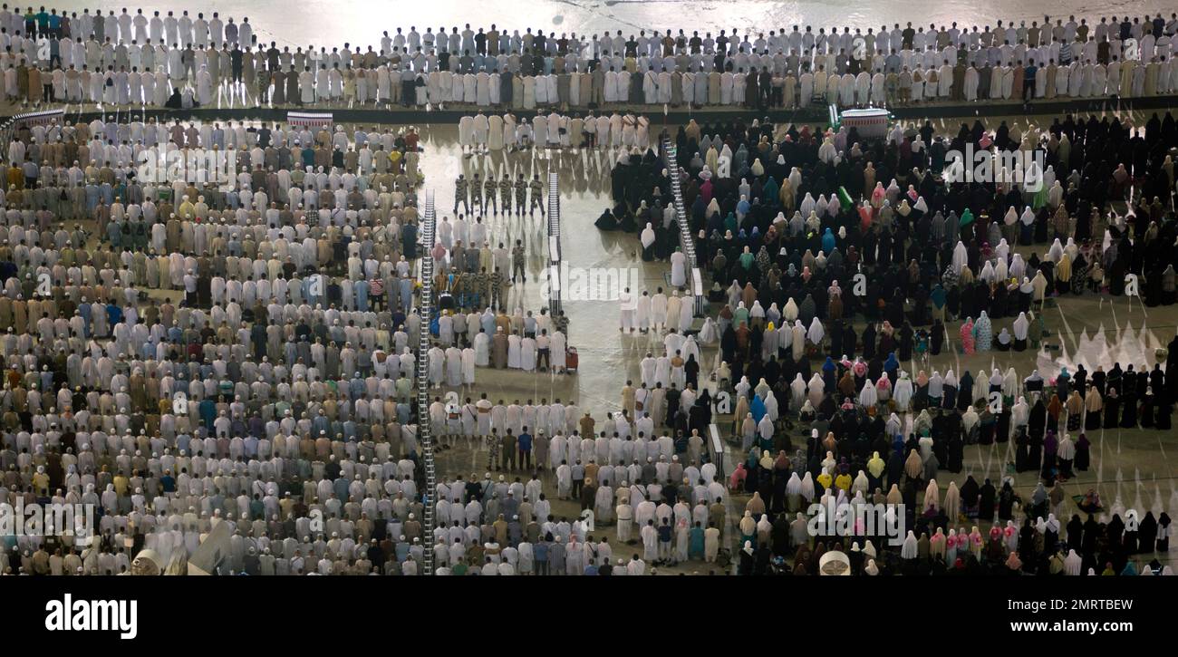 Muslim pilgrims pray at the Grand Mosque, ahead of the annual Hajj ...