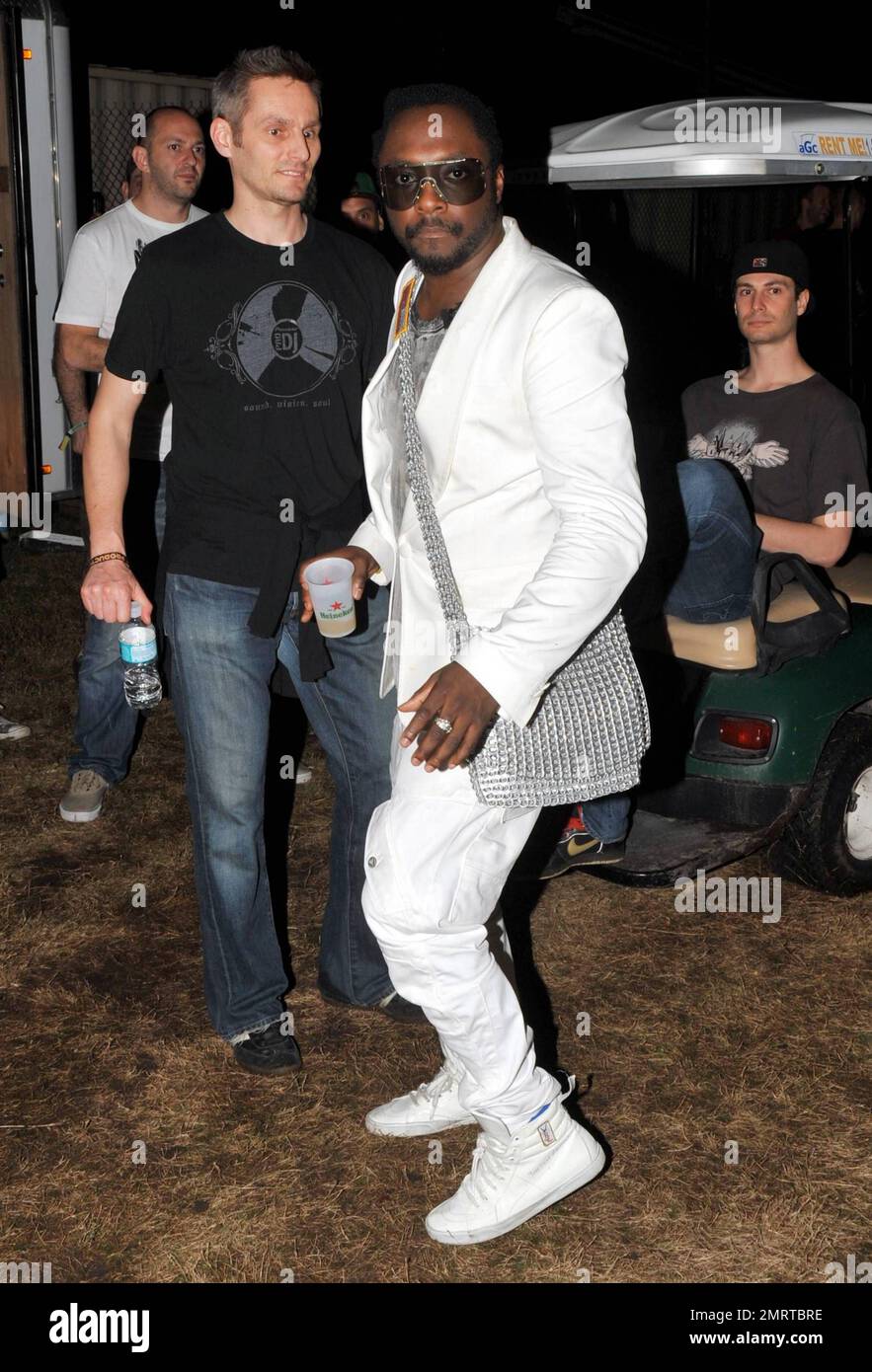 Will.i.am and apl.de.ap from the Black Eyed Peas and Redfoo and Sky Blu ...