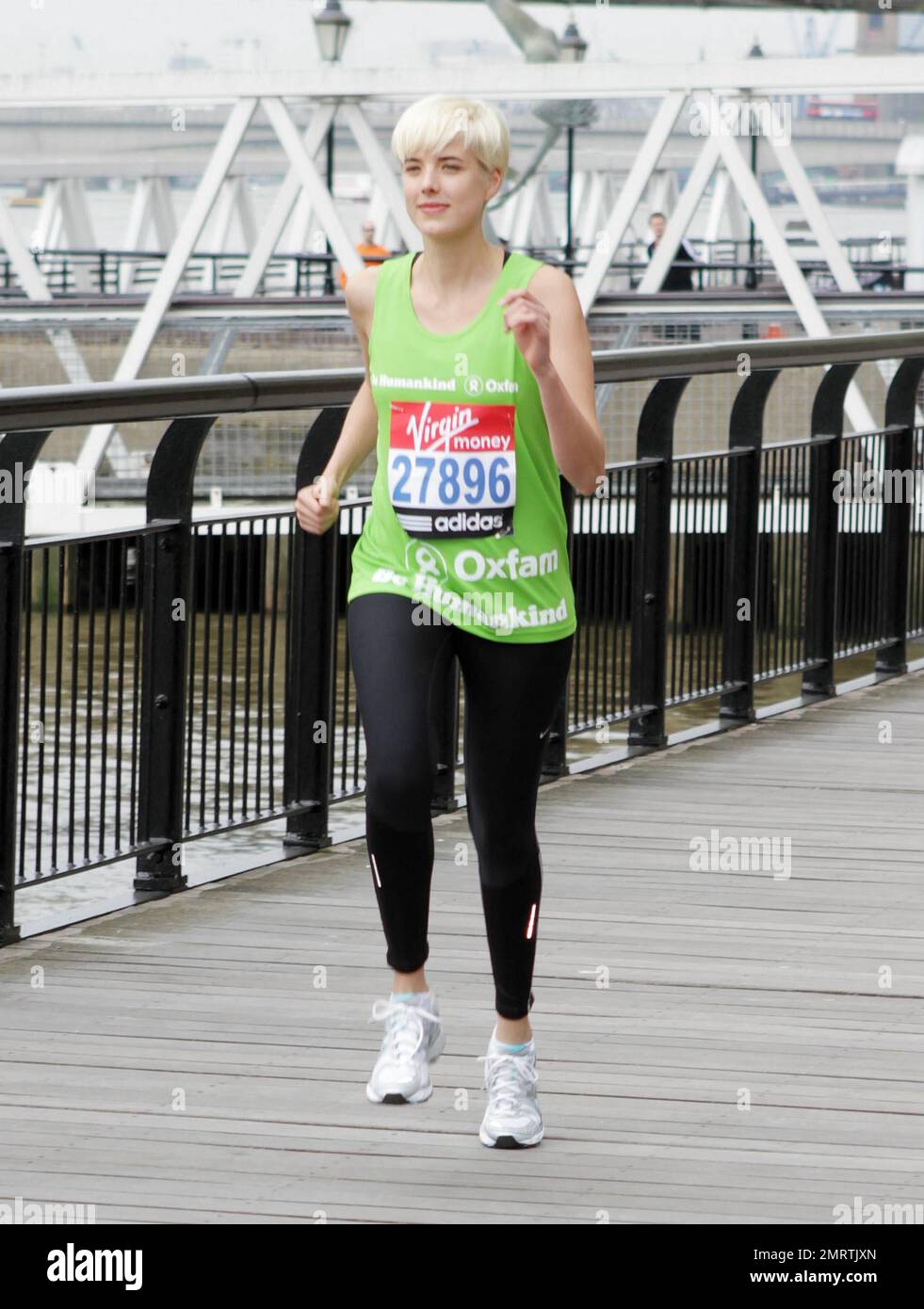 Model Agyness Deyn runs during a photo call prior to the Virgin London ...