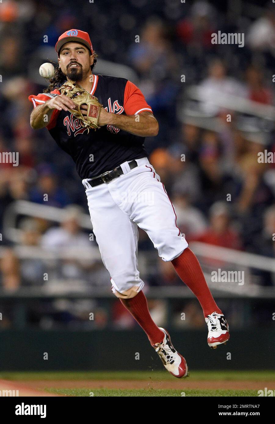 Washington Nationals third baseman Anthony Rendon throws to first to ...