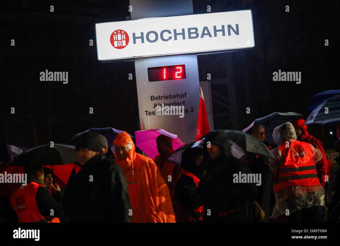 Hamburg, Germany. 01st Feb, 2023. Striking employees stand at a picket ...