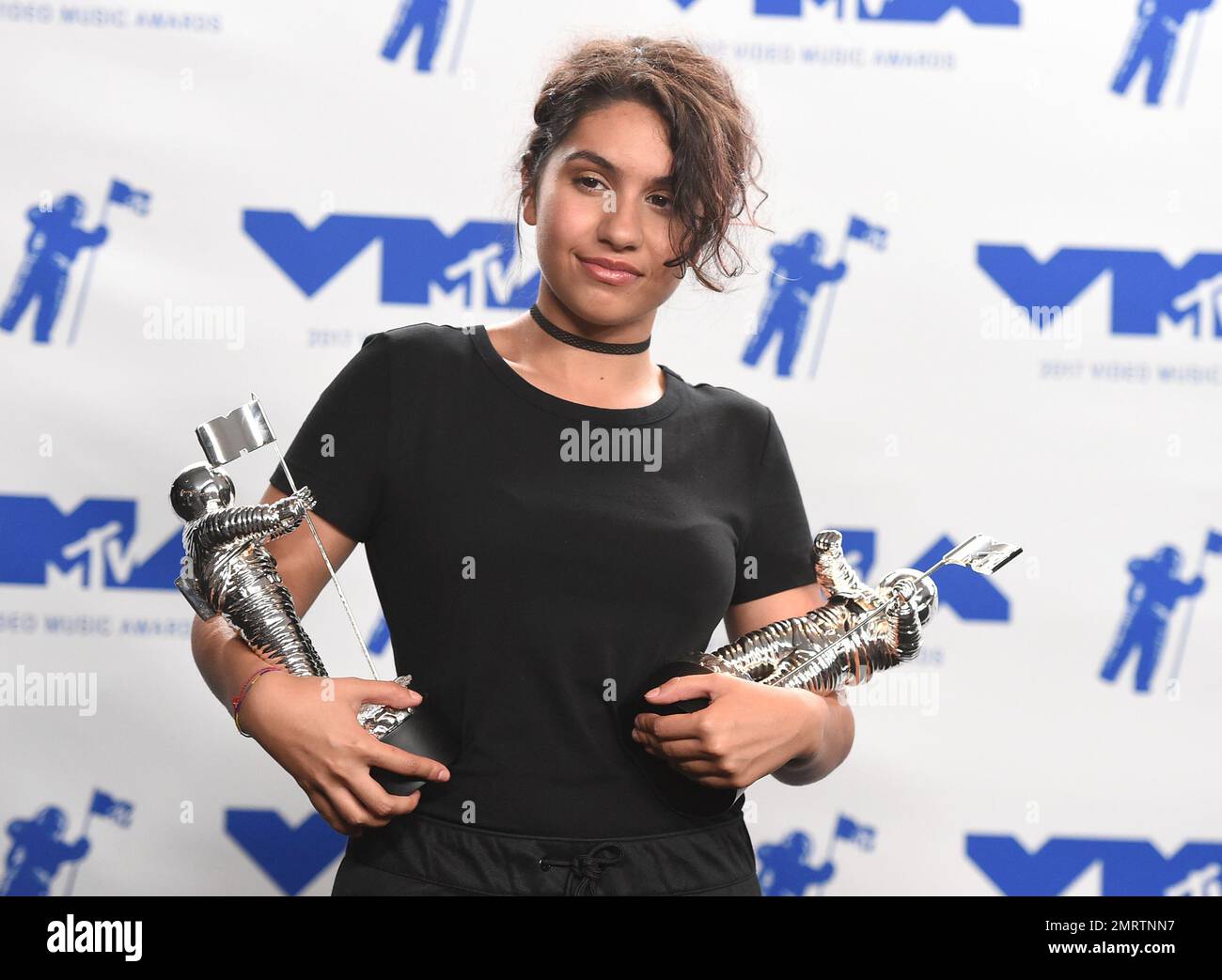 Alessia Cara poses in the press room with the awards for best dance ...